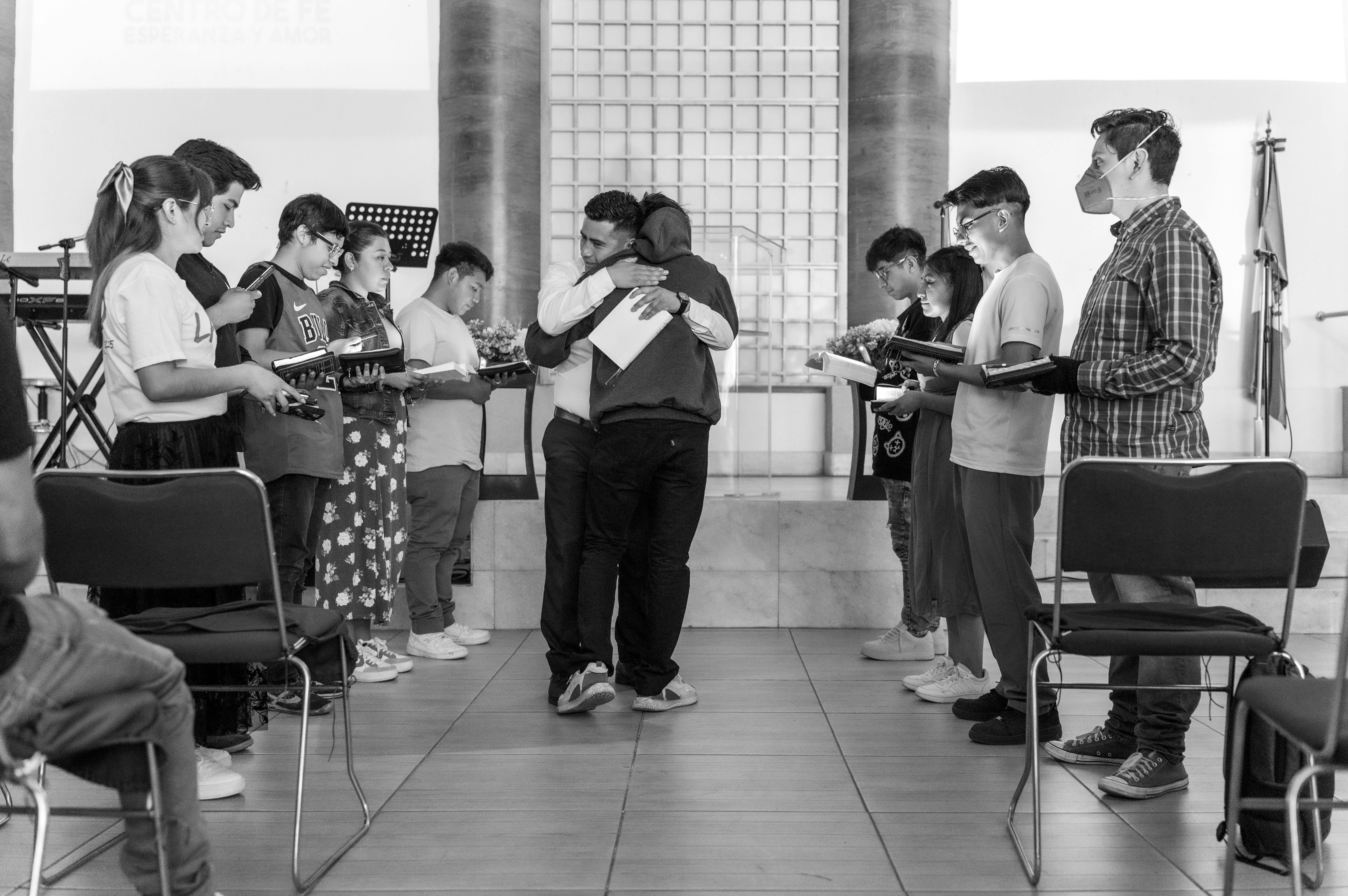 People Standing and Hugging at Religion Gathering · Free Stock Photo