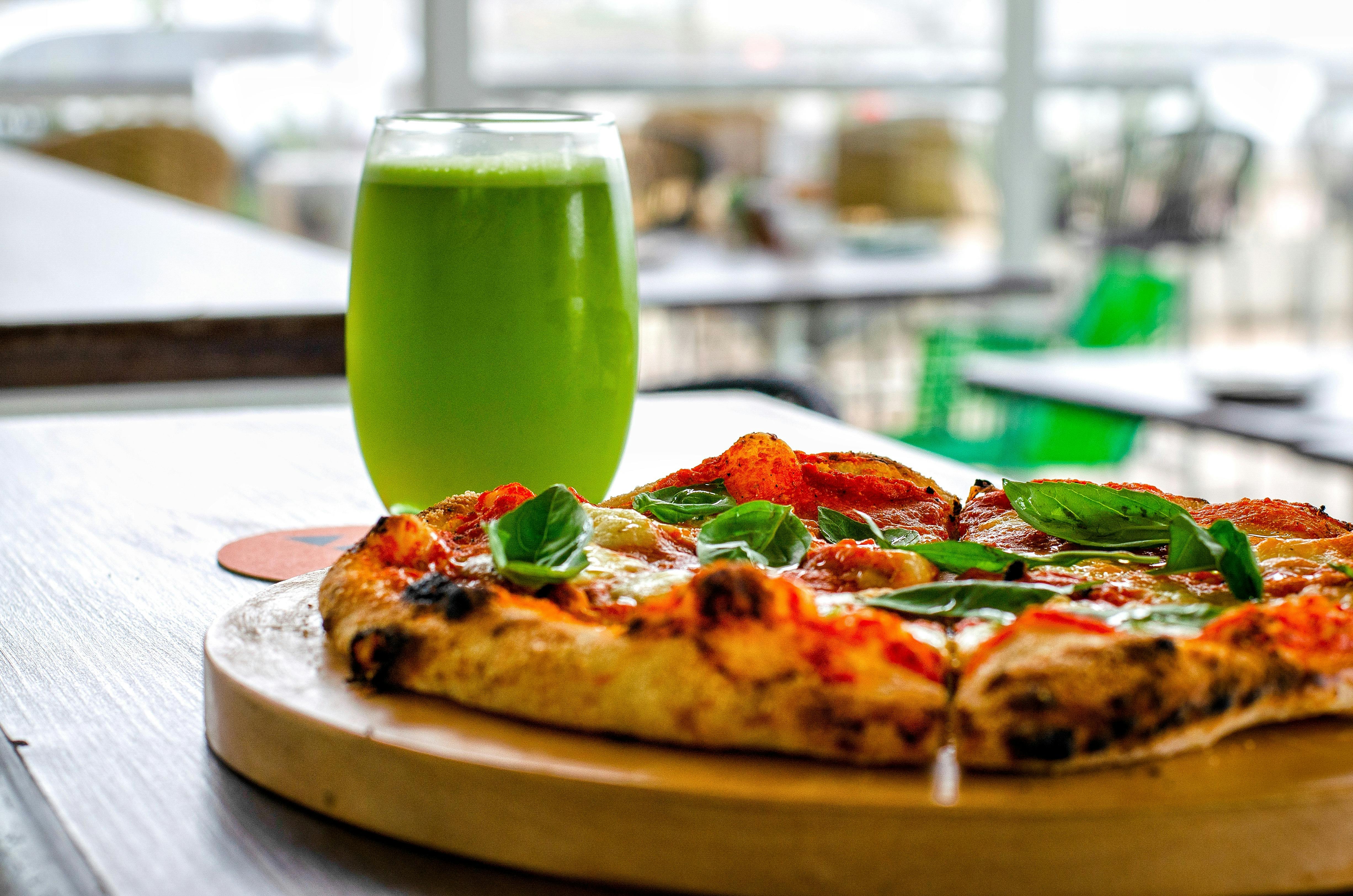 Pizza and Green Smoothie · Free Stock Photo