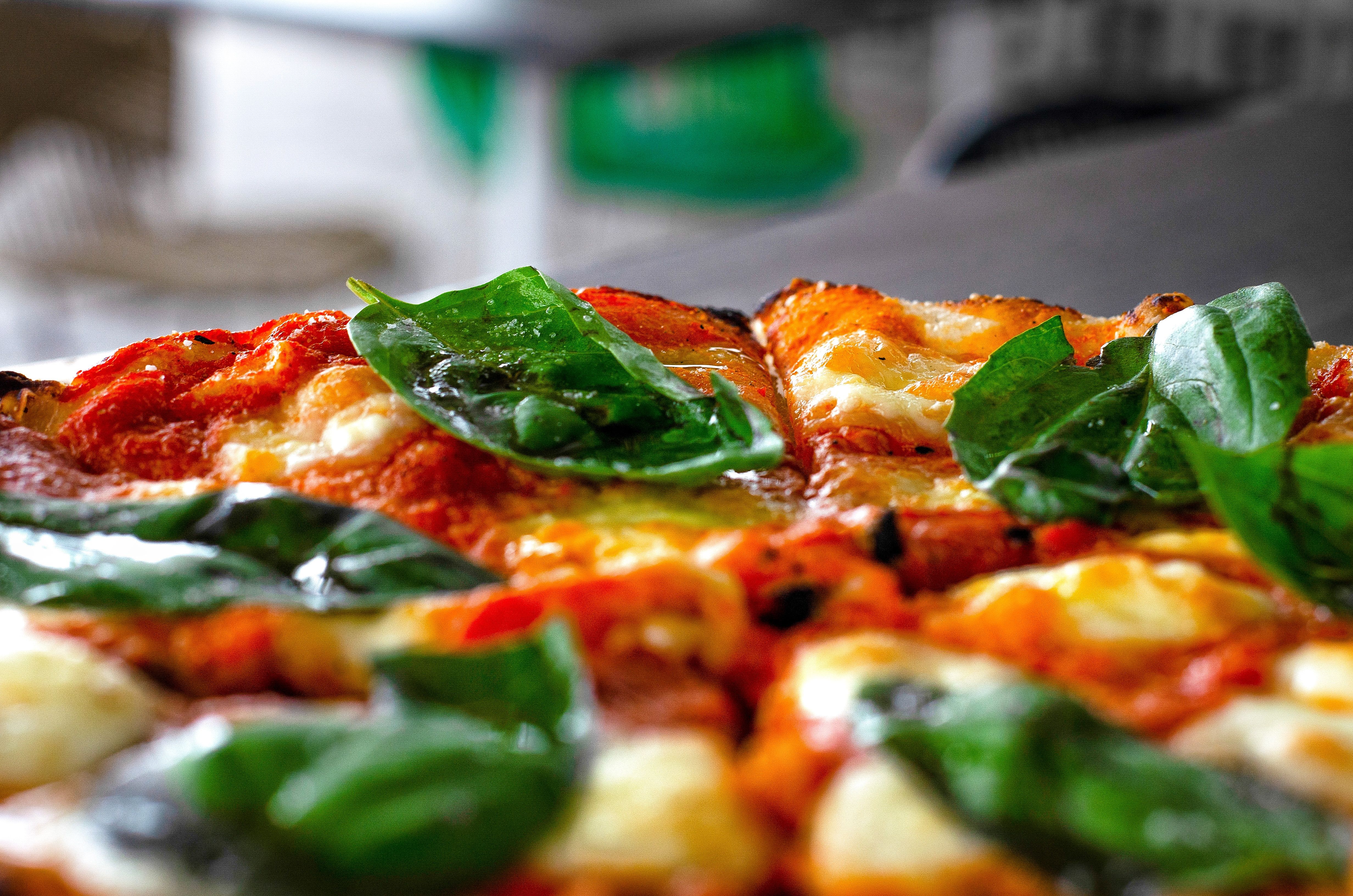 Pizza with Basil Leaves · Free Stock Photo