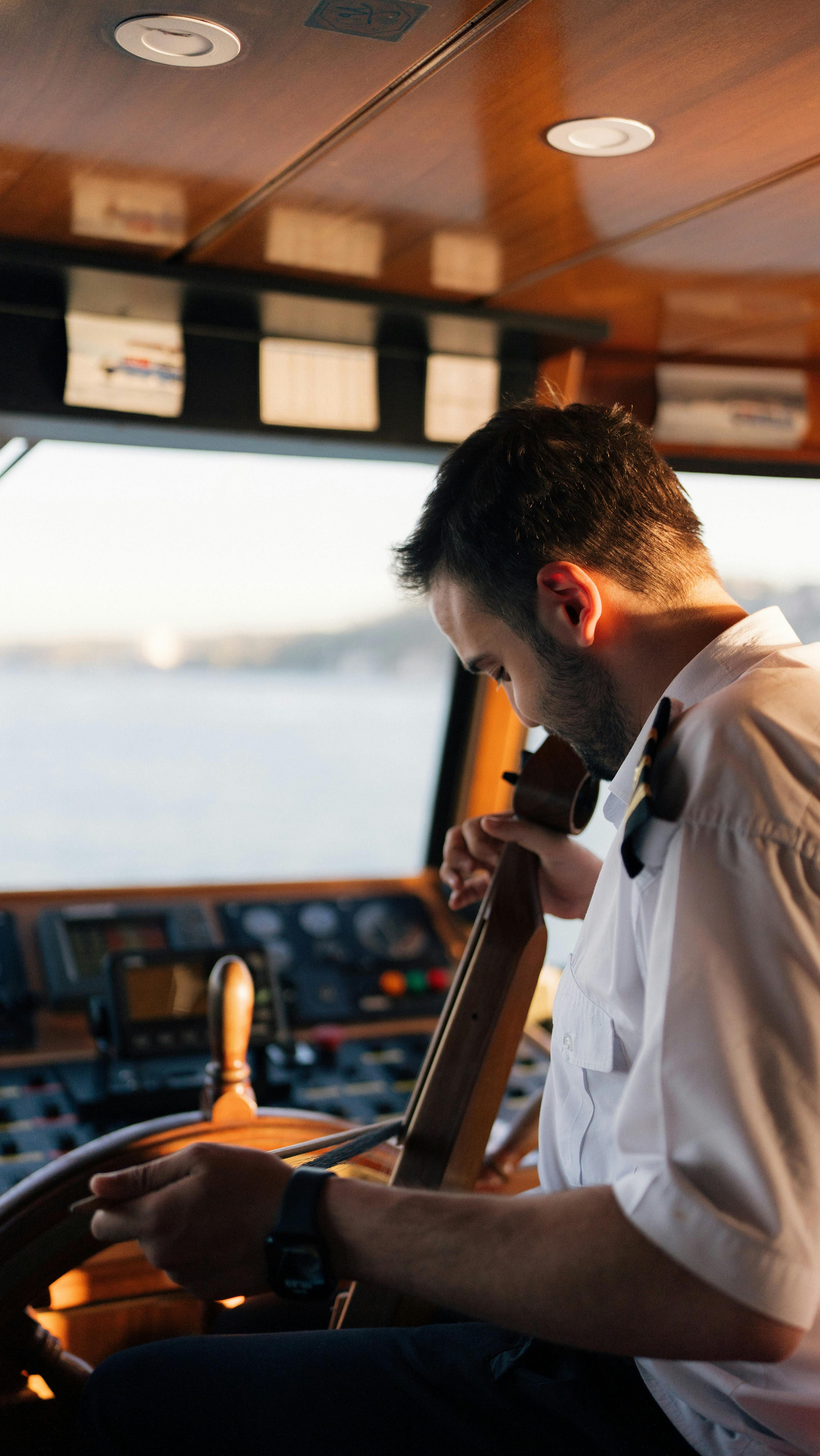Ferry Captain with Instrument · Free Stock Photo
