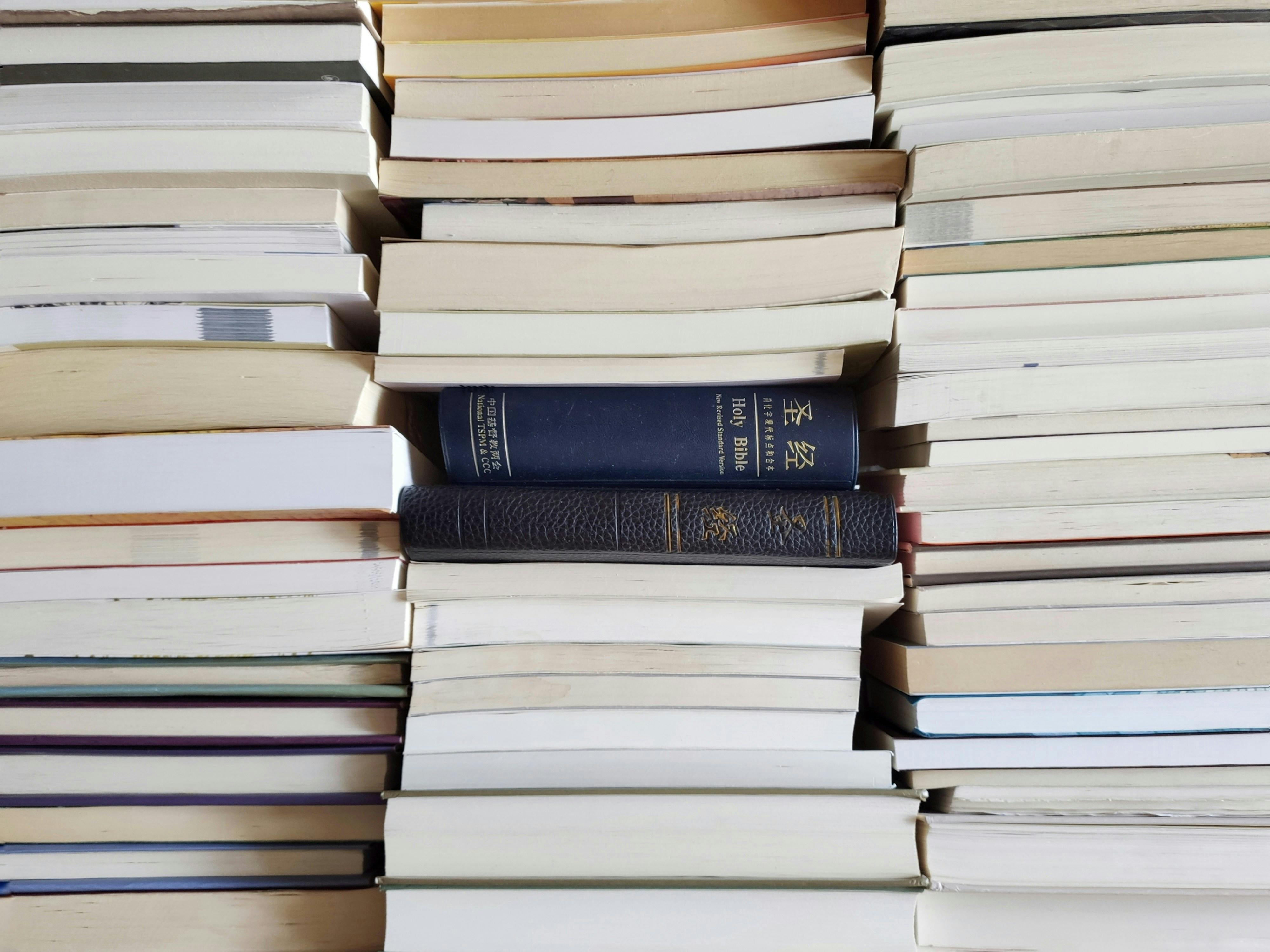 Chinese Bible in Stack of Books · Free Stock Photo