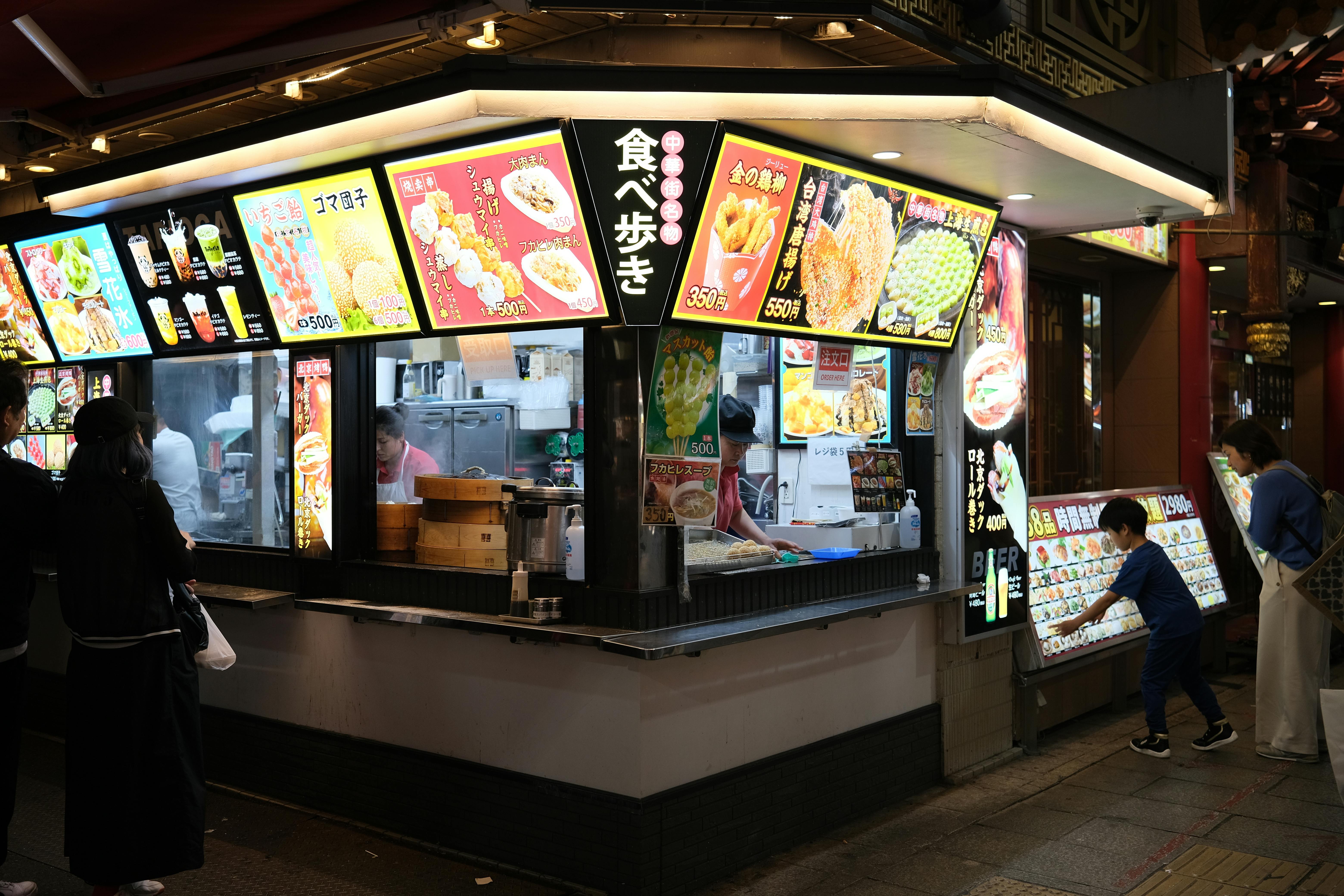 Restaurant Stall in a City at Dusk · Free Stock Photo