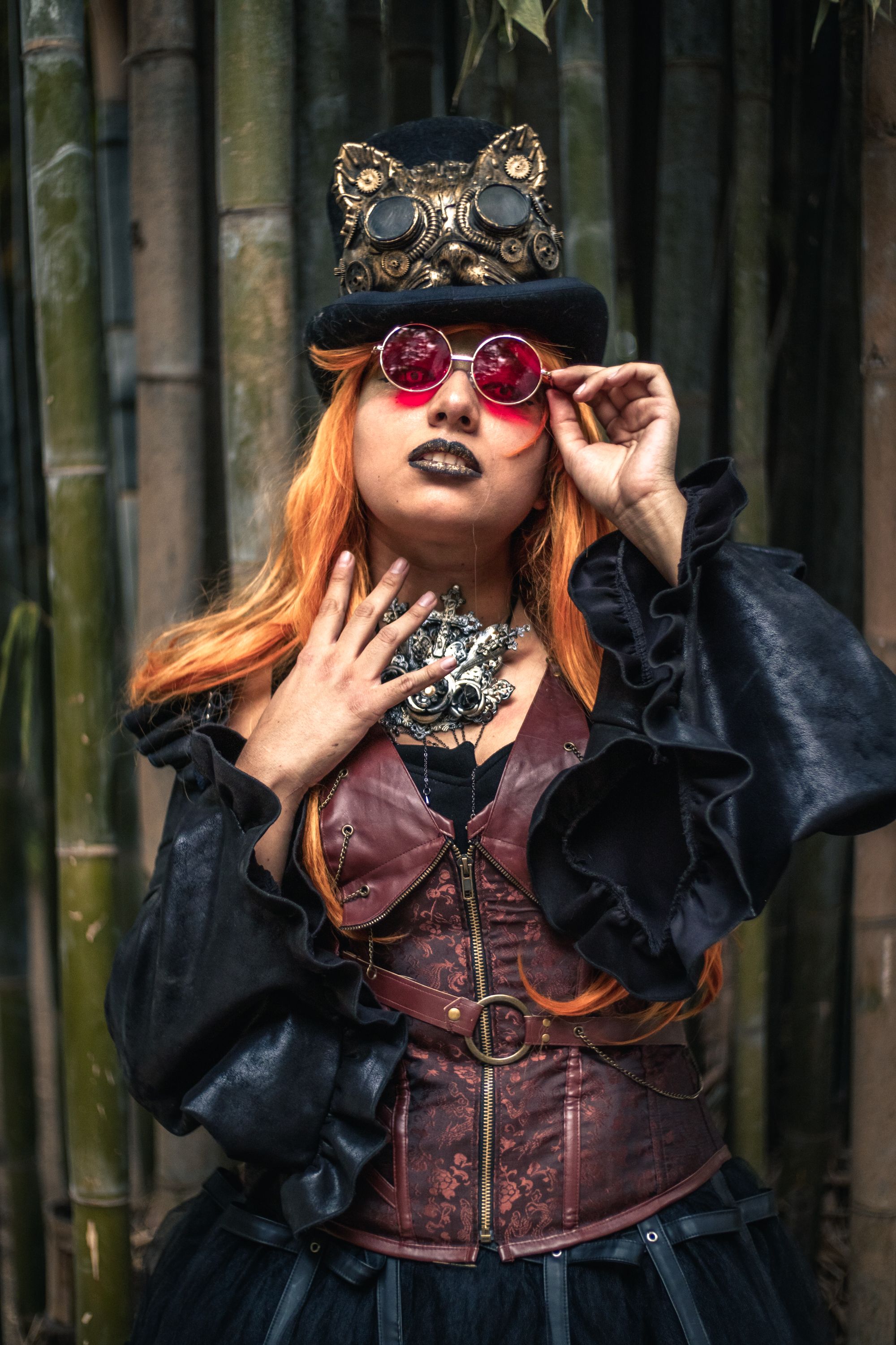 A woman in a steampunk costume with red hair · Free Stock Photo