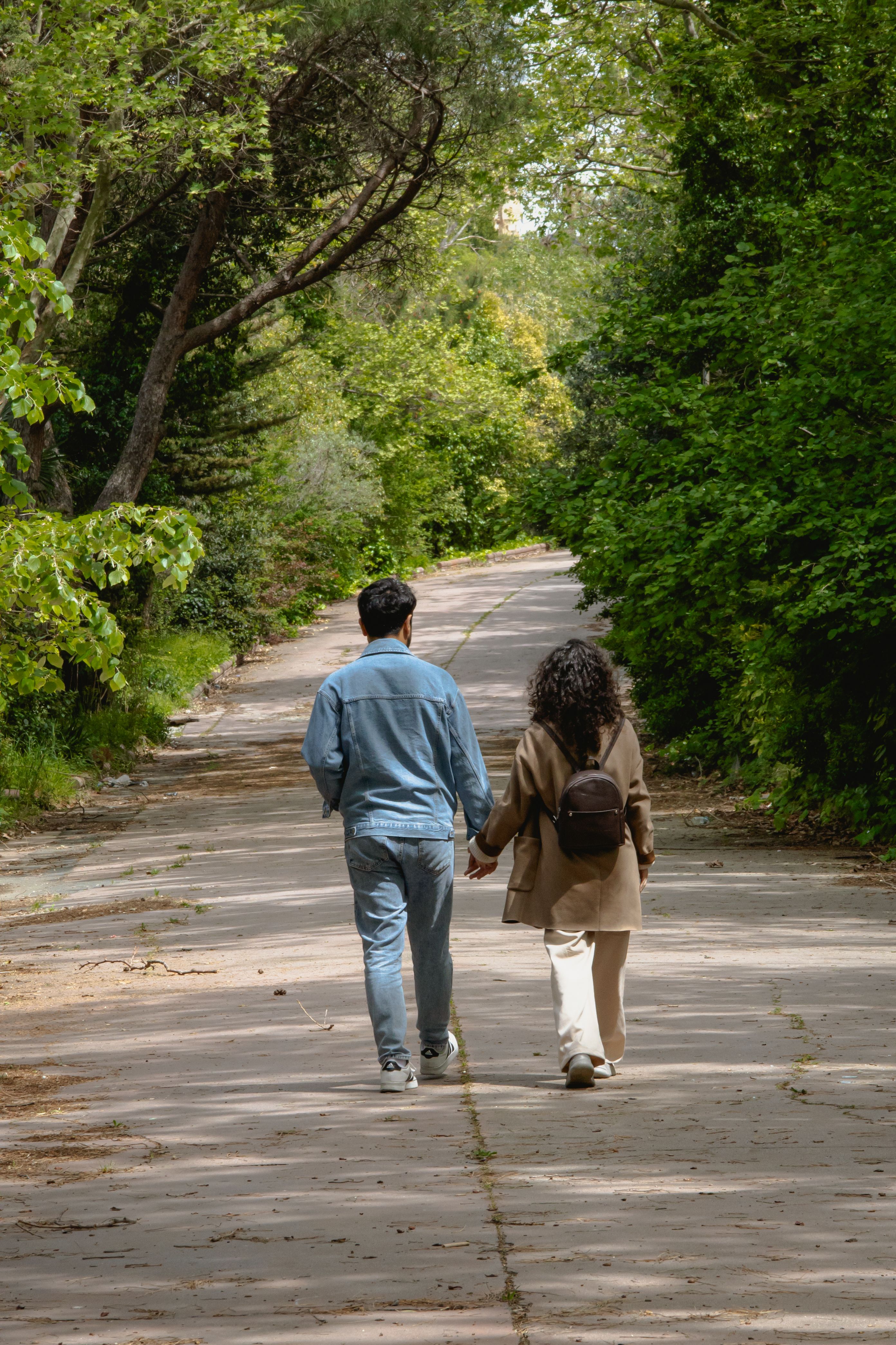 Back View of a Couple Walking · Free Stock Photo