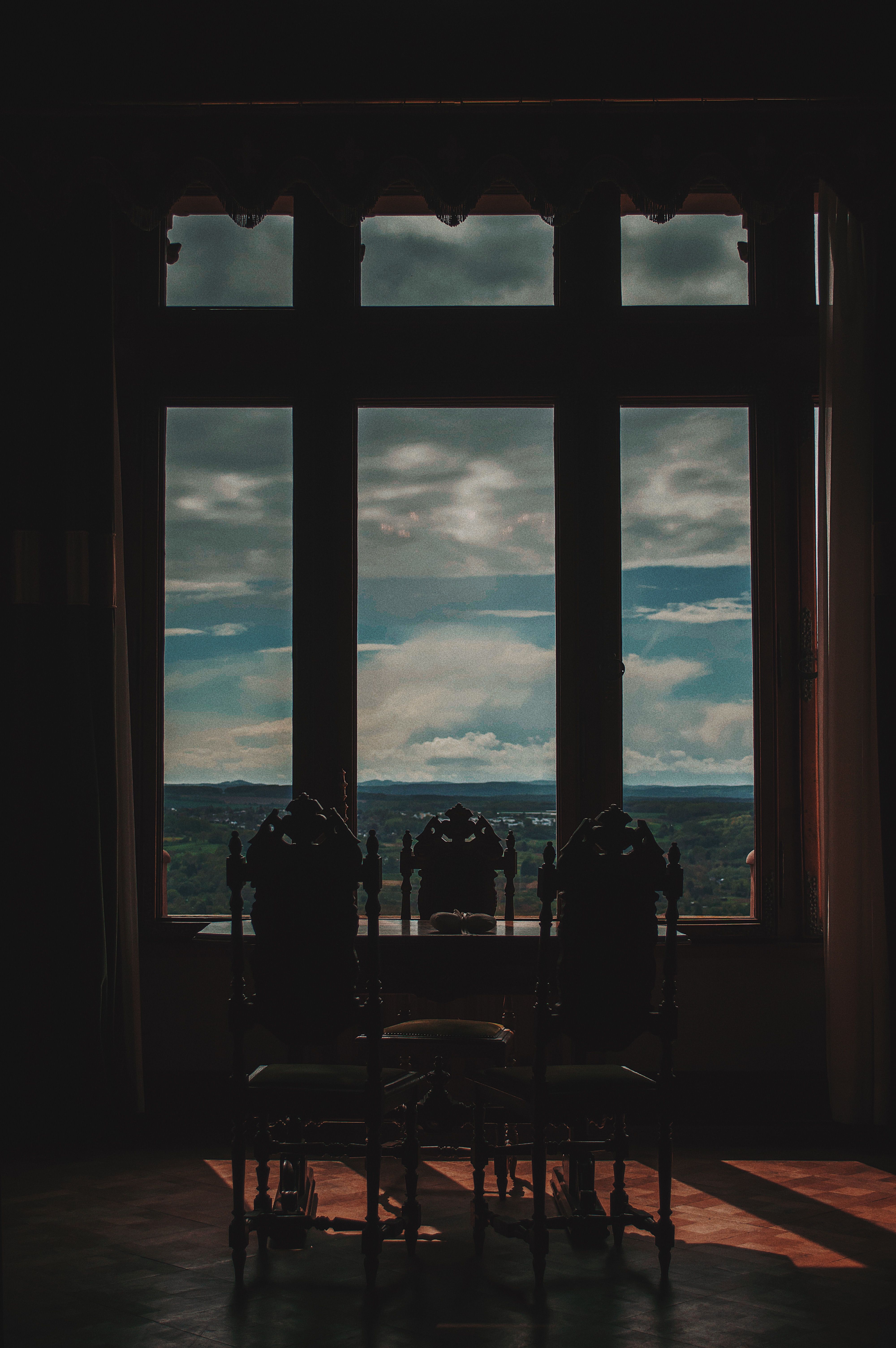 Three Chairs Beside Window · Free Stock Photo