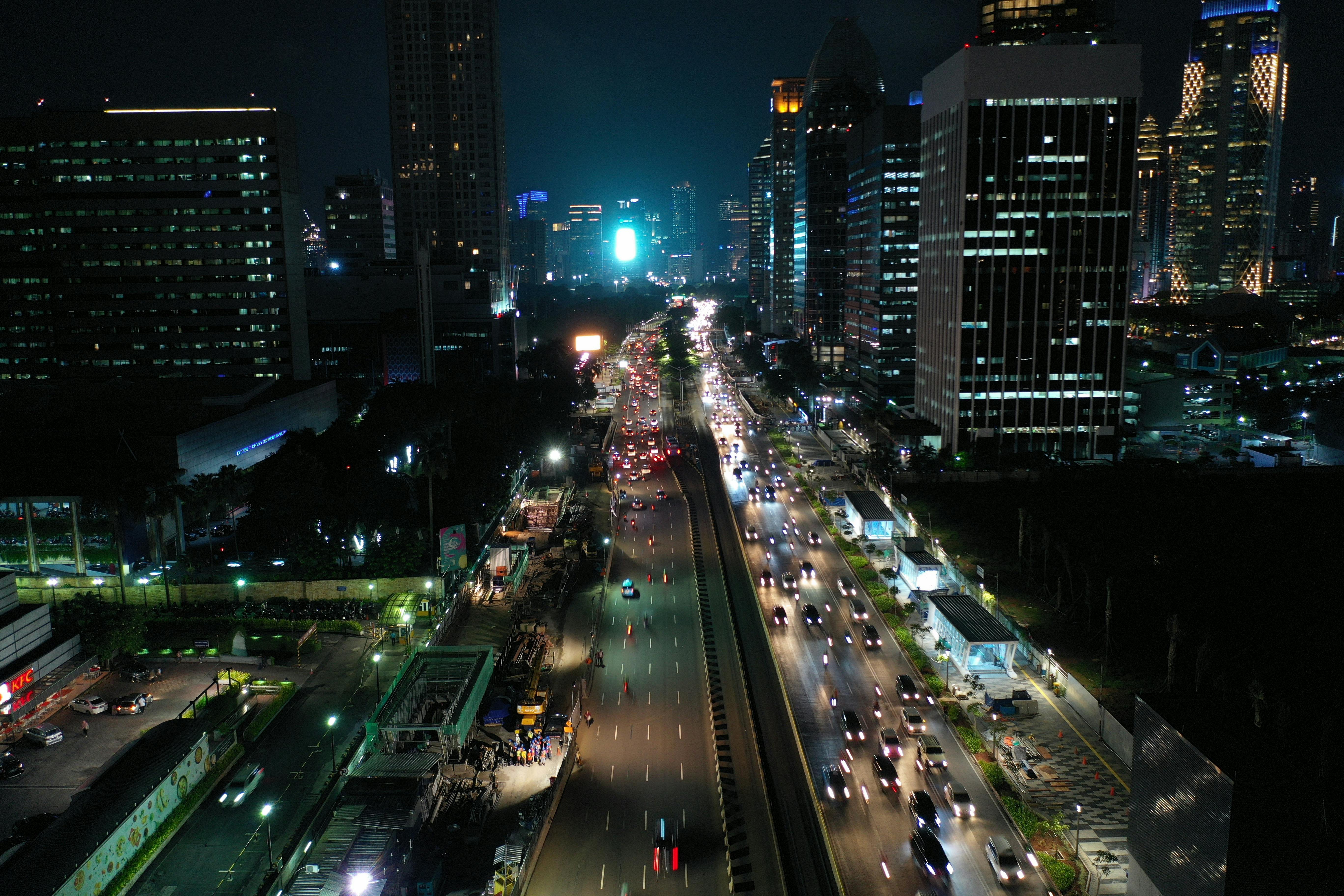Aerial View of Highway Through the City at Night · Free Stock Photo