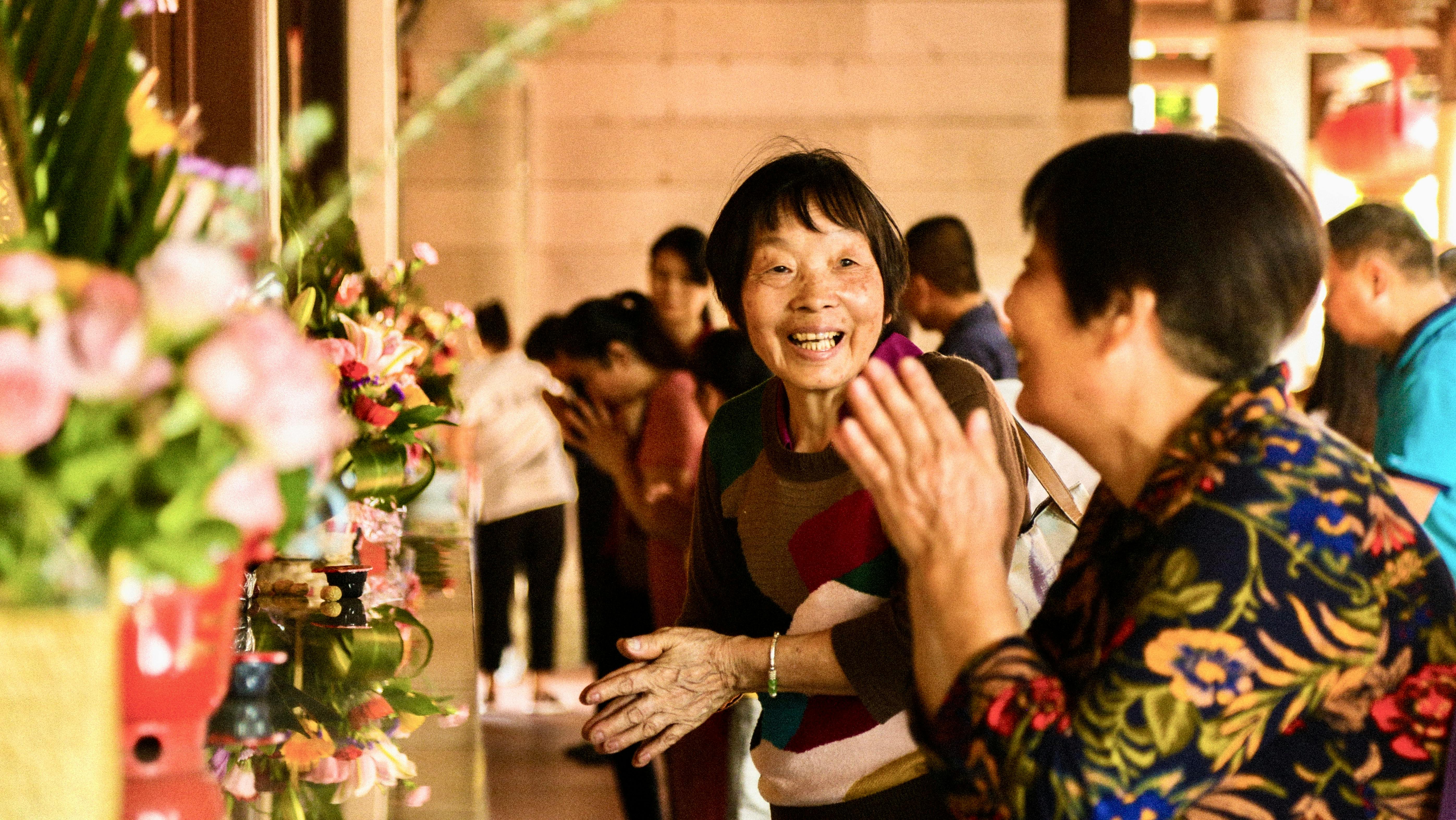 Smiling Elderly Women Talking at Temple · Free Stock Photo