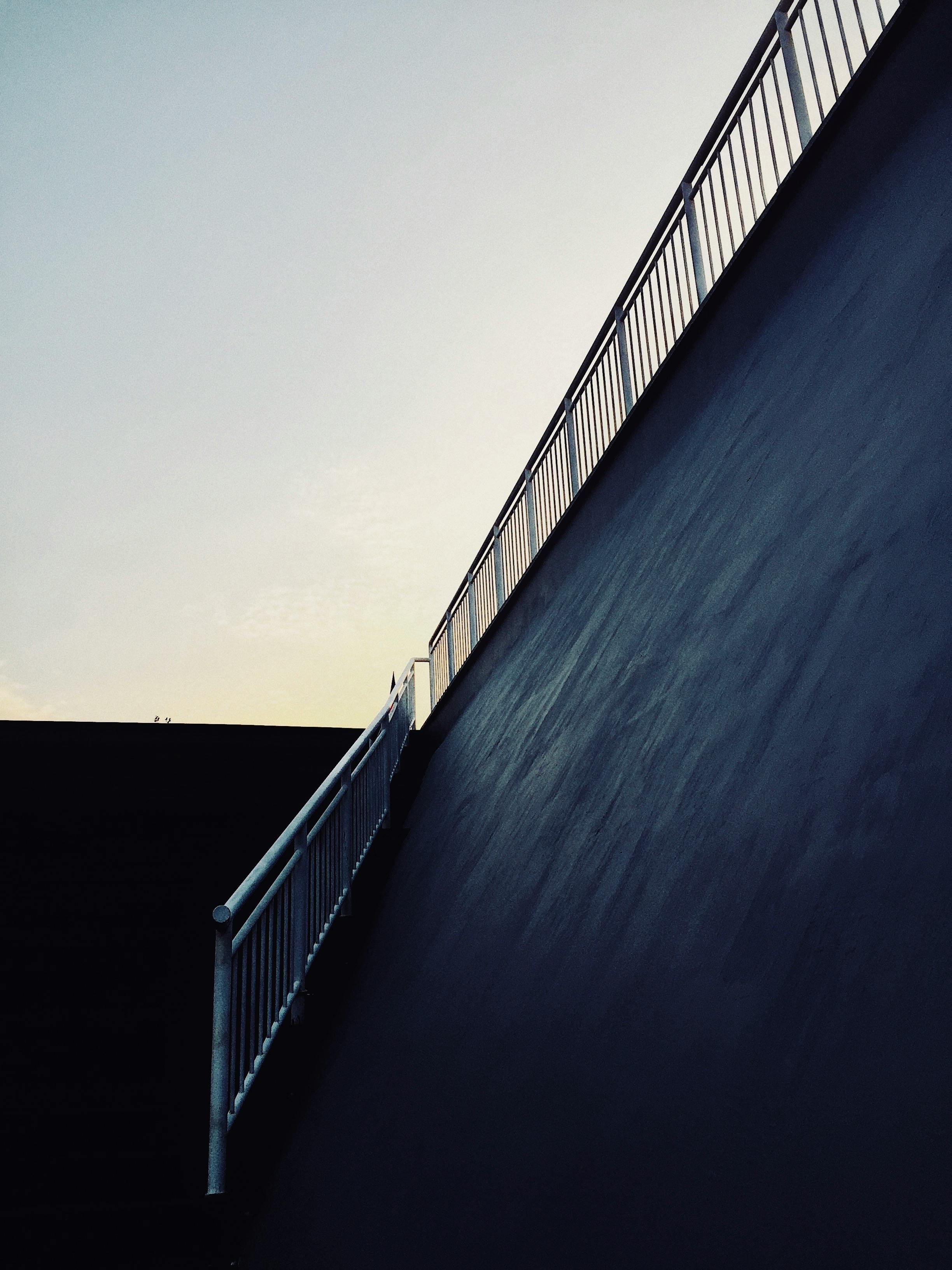 Railing on Building Wall · Free Stock Photo