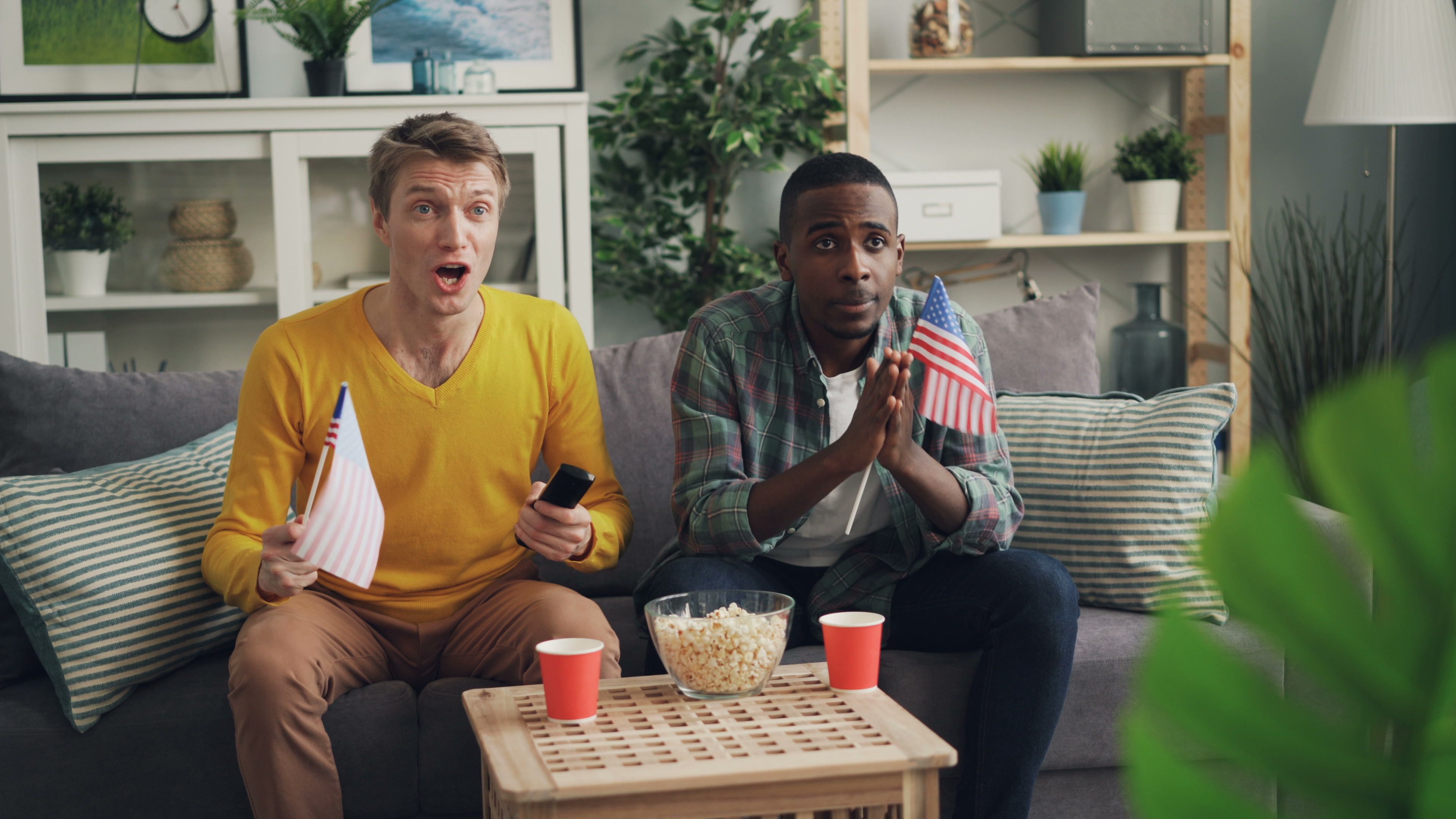 Men Sitting on Couch and Watching Sport · Free Stock Photo