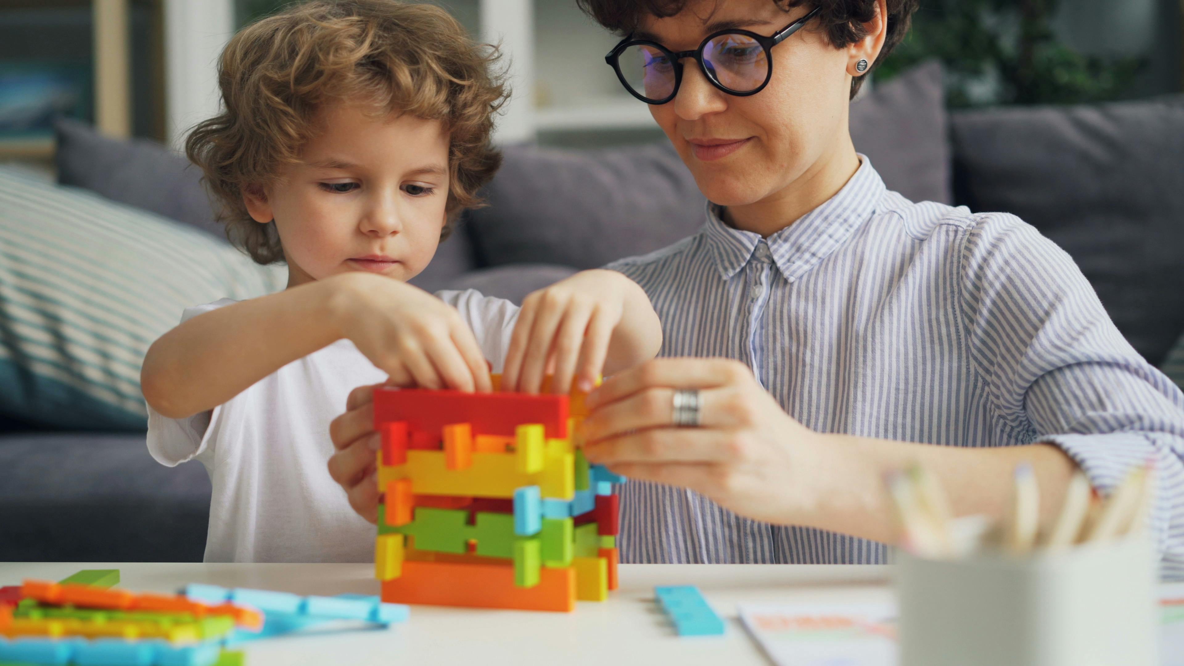 Mother and Son Playing with Blocks · Free Stock Photo