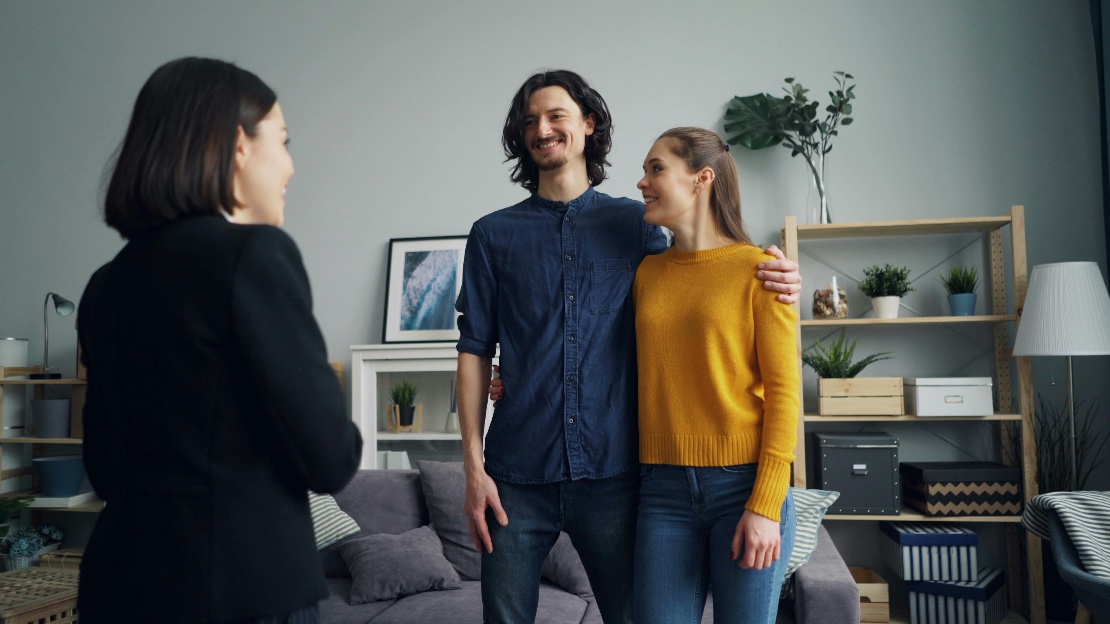 Real Estate Agent and Couple in House · Free Stock Photo