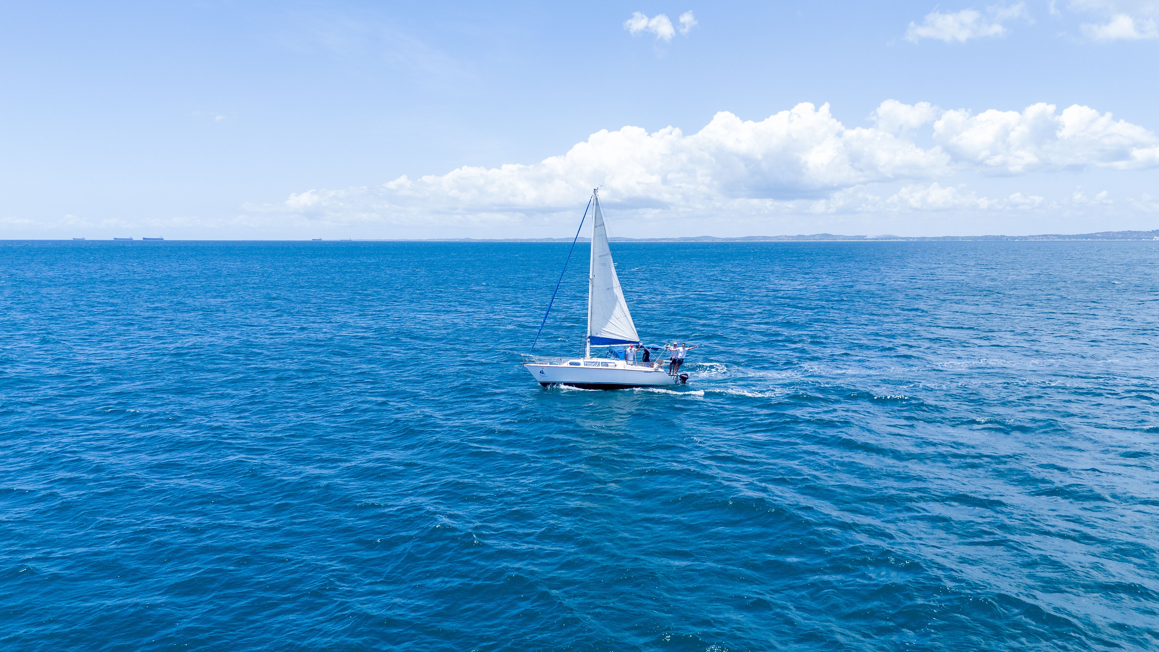 View of People Sailing on a Blue Ocean · Free Stock Photo