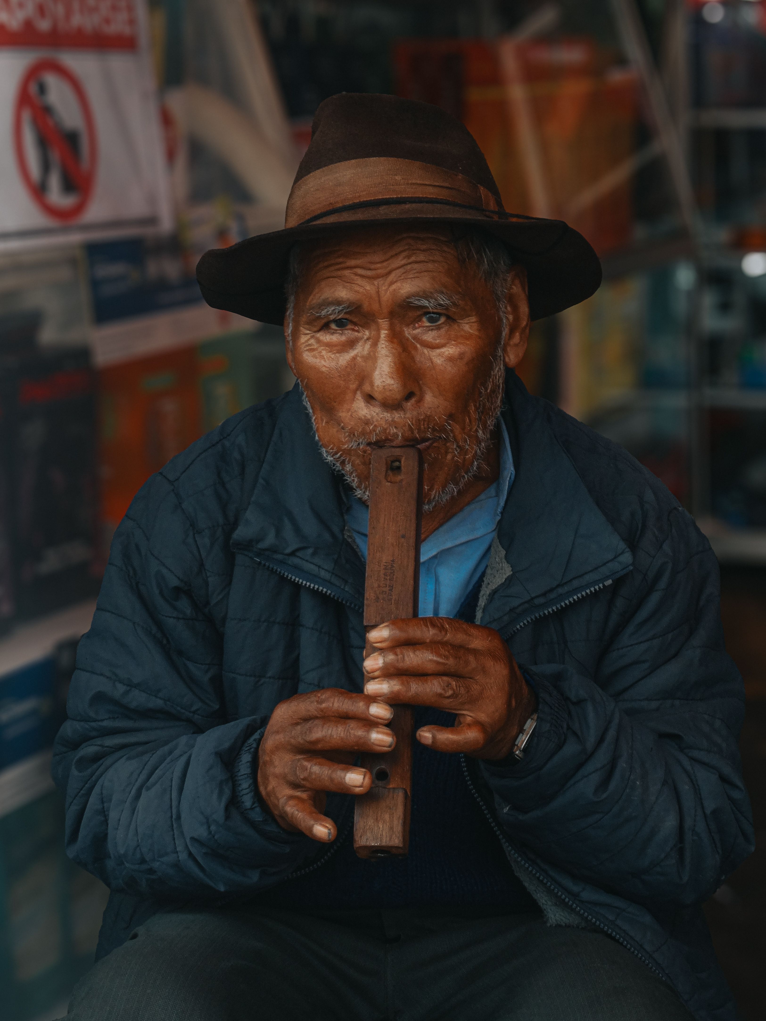 Elderly Man Playing Traditional Flute · Free Stock Photo