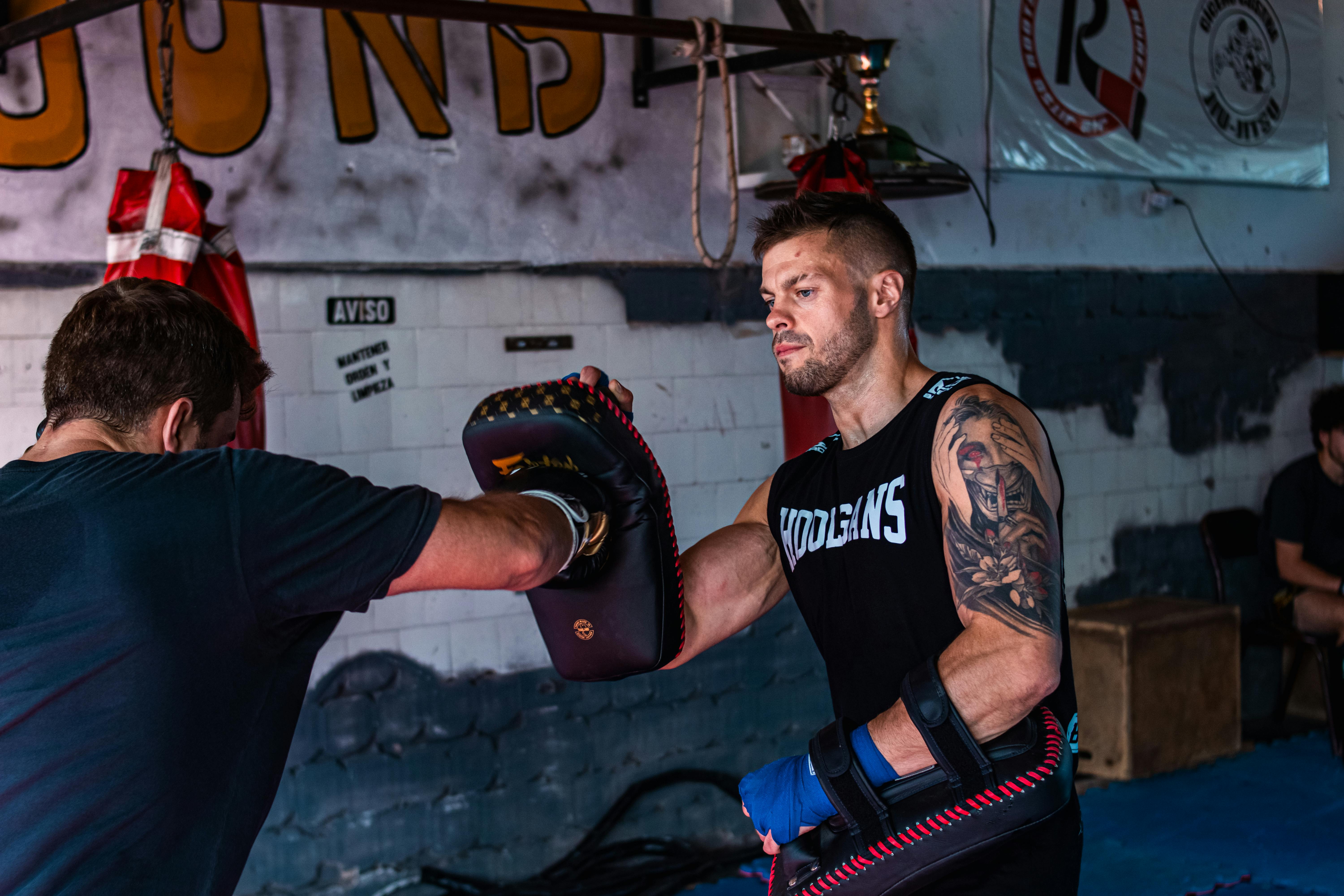 Two Kickboxers Training in a Gym · Free Stock Photo