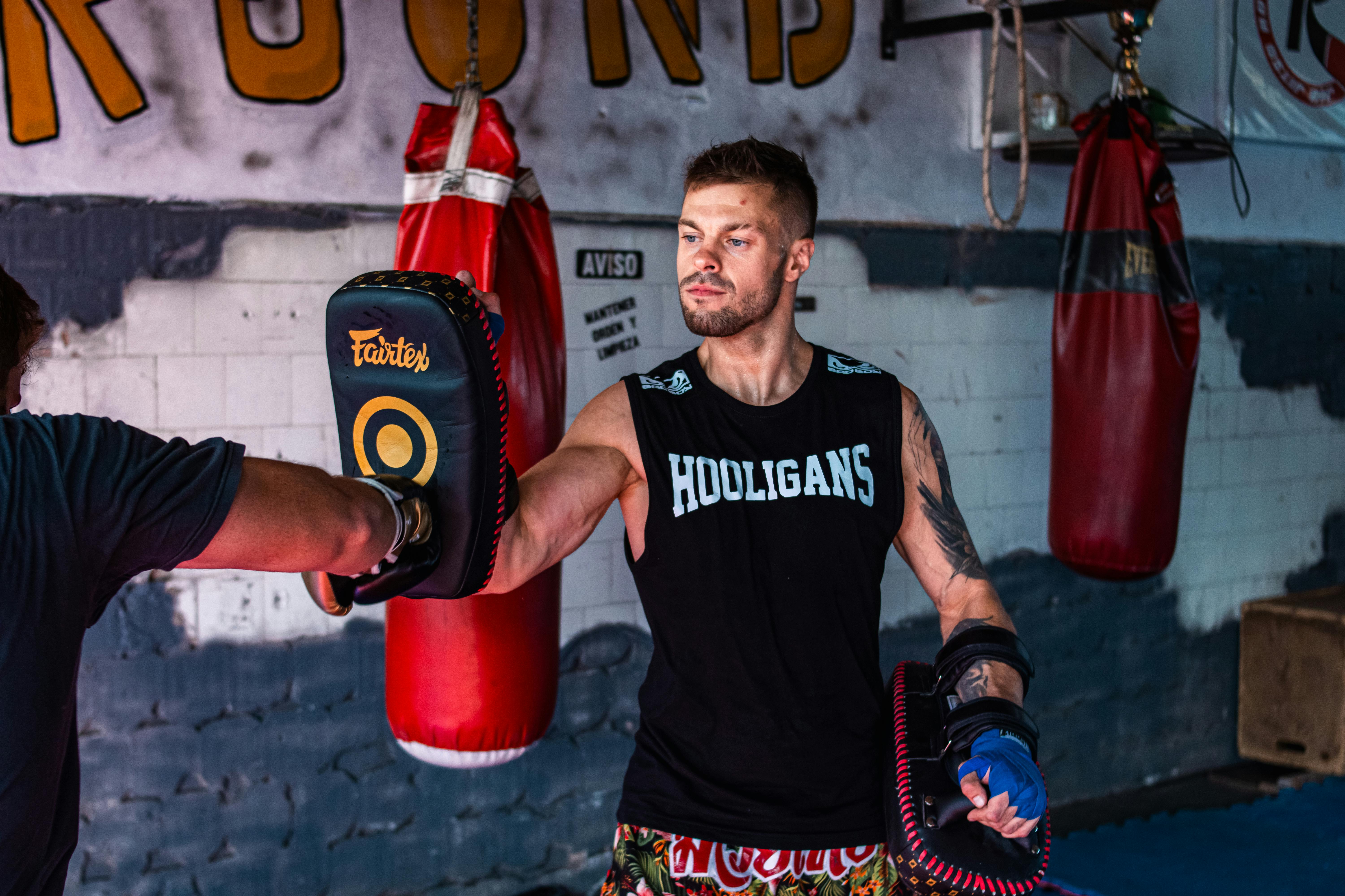Two Kickboxers Training in a Gym · Free Stock Photo