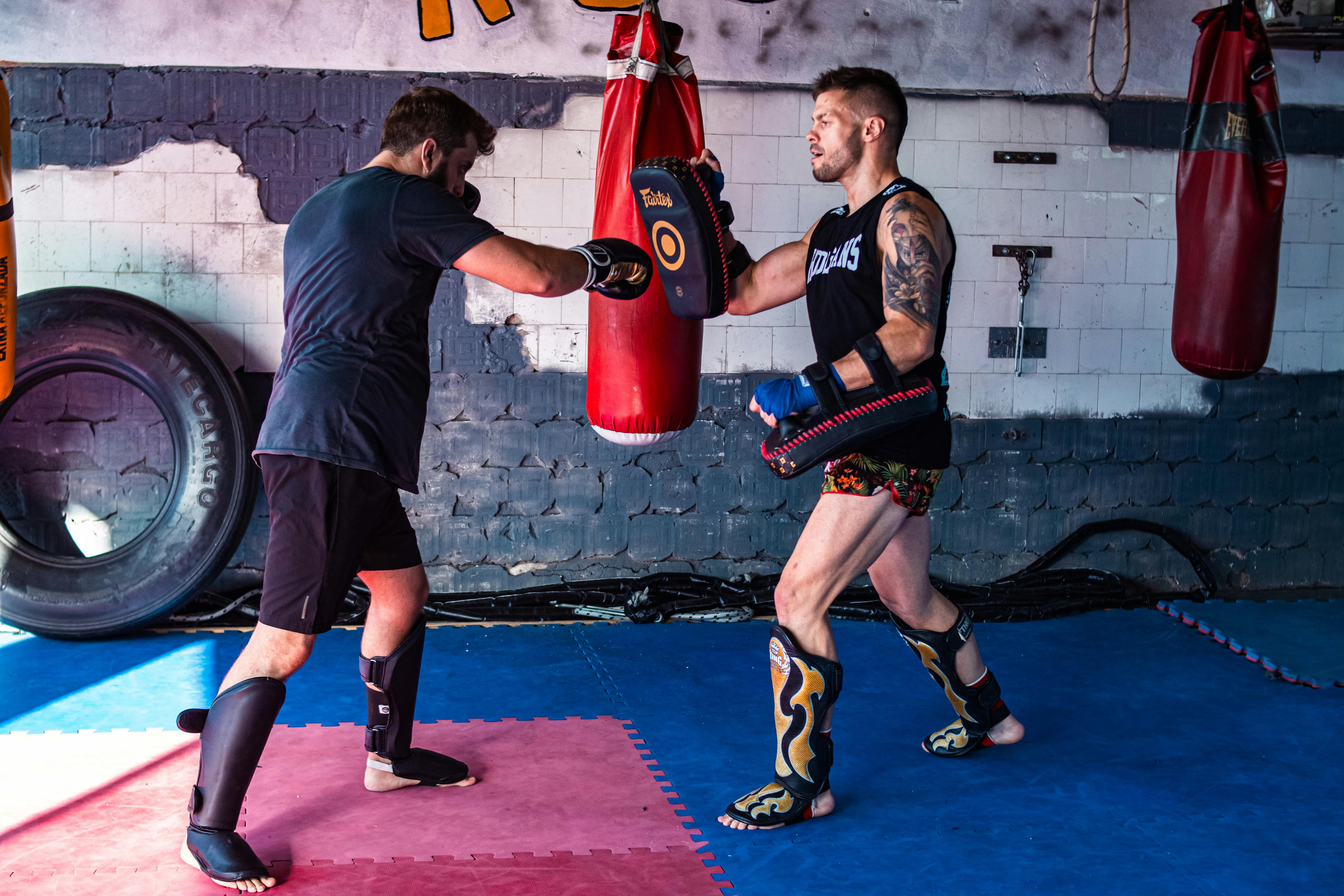 Two Kickboxers Training in a Gym · Free Stock Photo