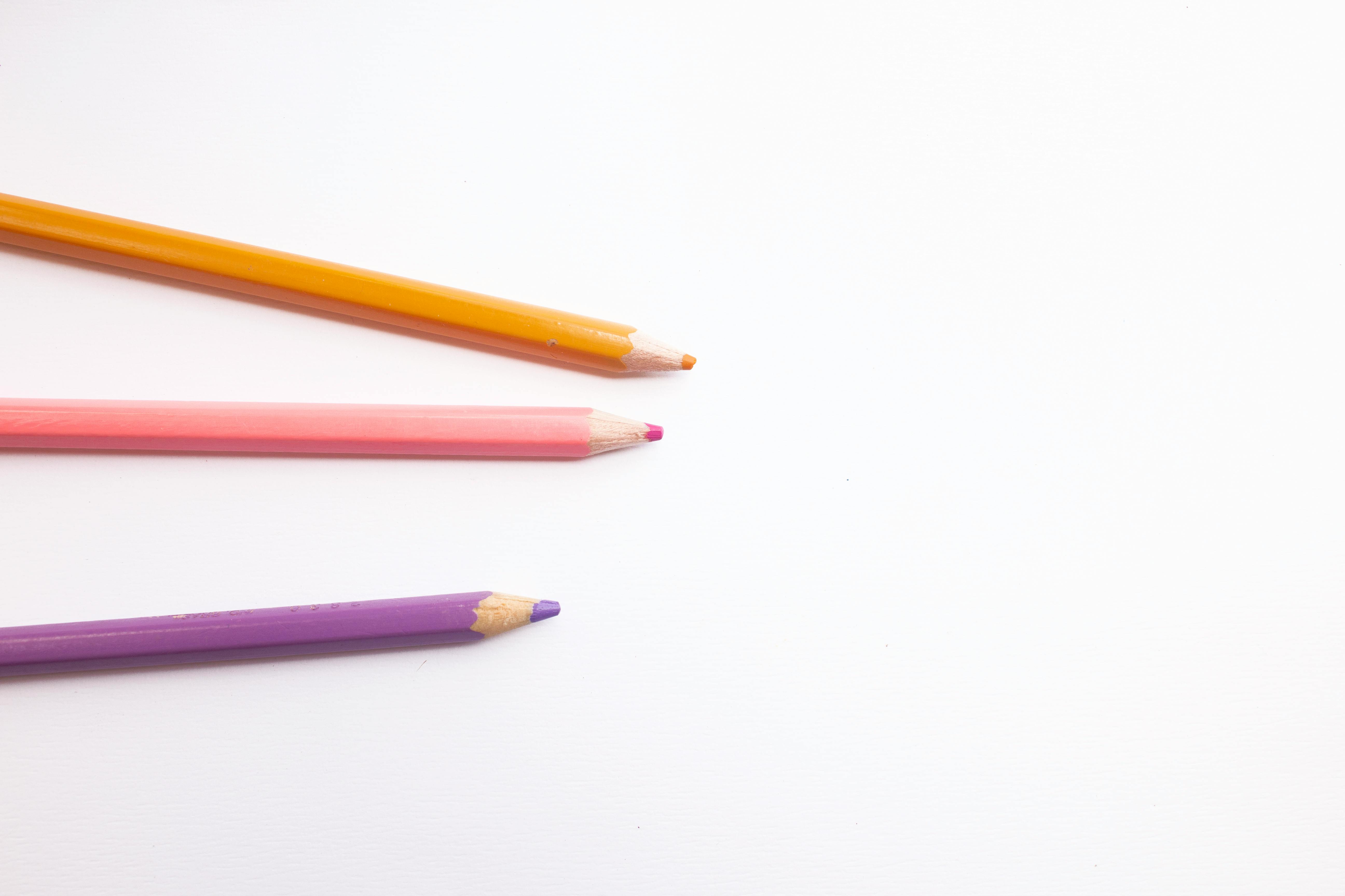 three colored pencils · Free Stock Photo