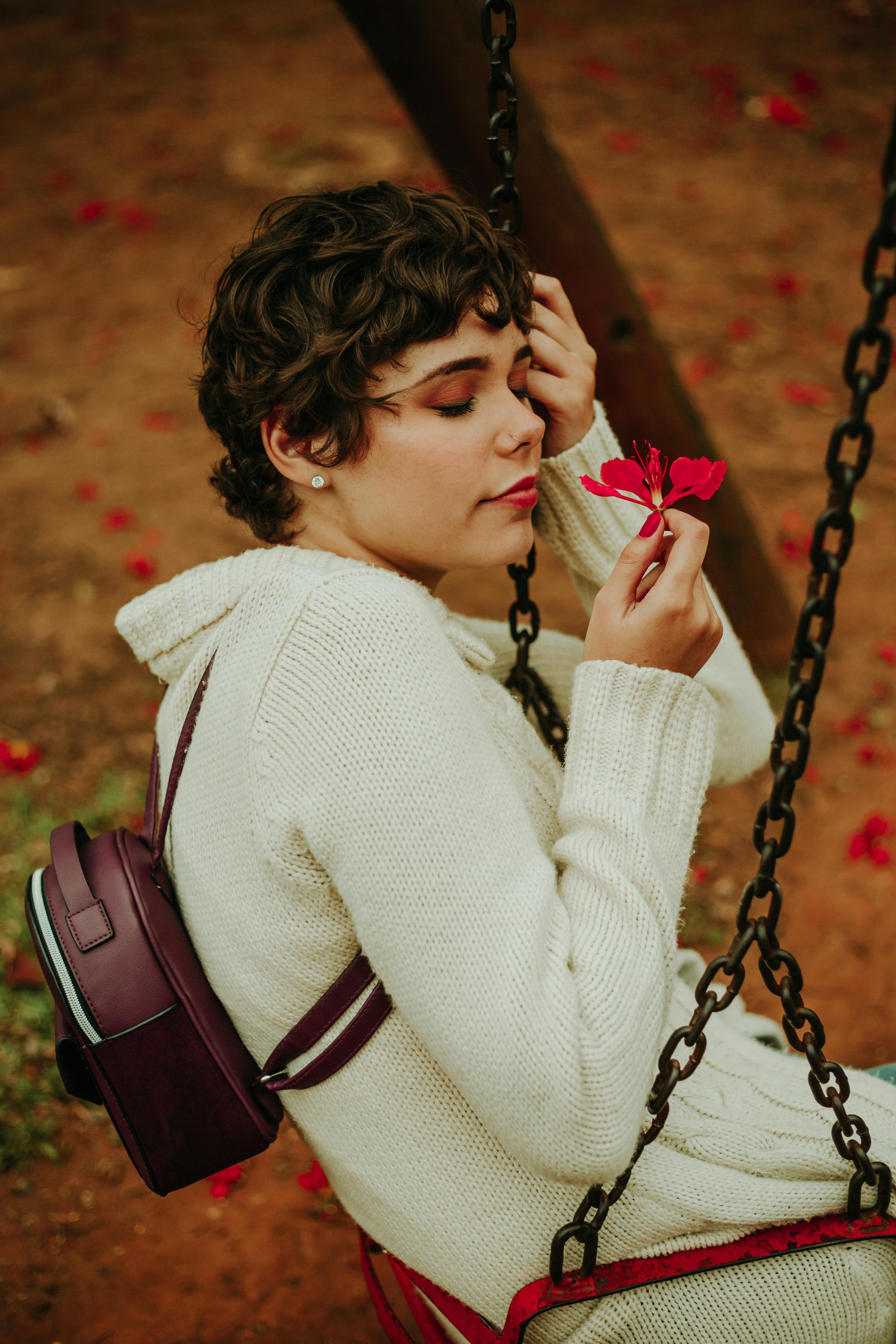 Man in Black Puffer Jacket and Distress Jeans Sitting in Couch · Free ...