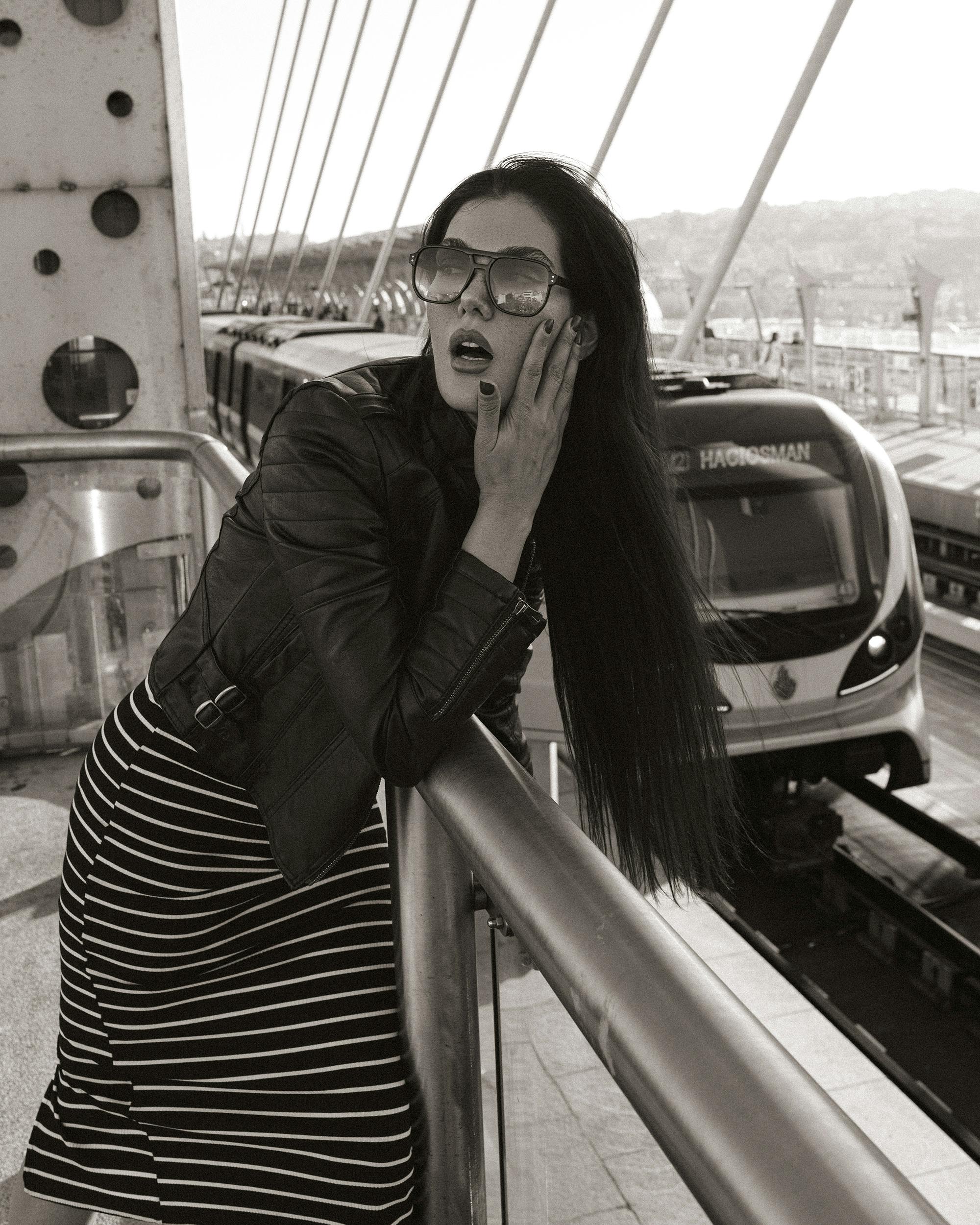 Model in a Striped Dress and Leather Jacket on the Golden Horn Metro ...