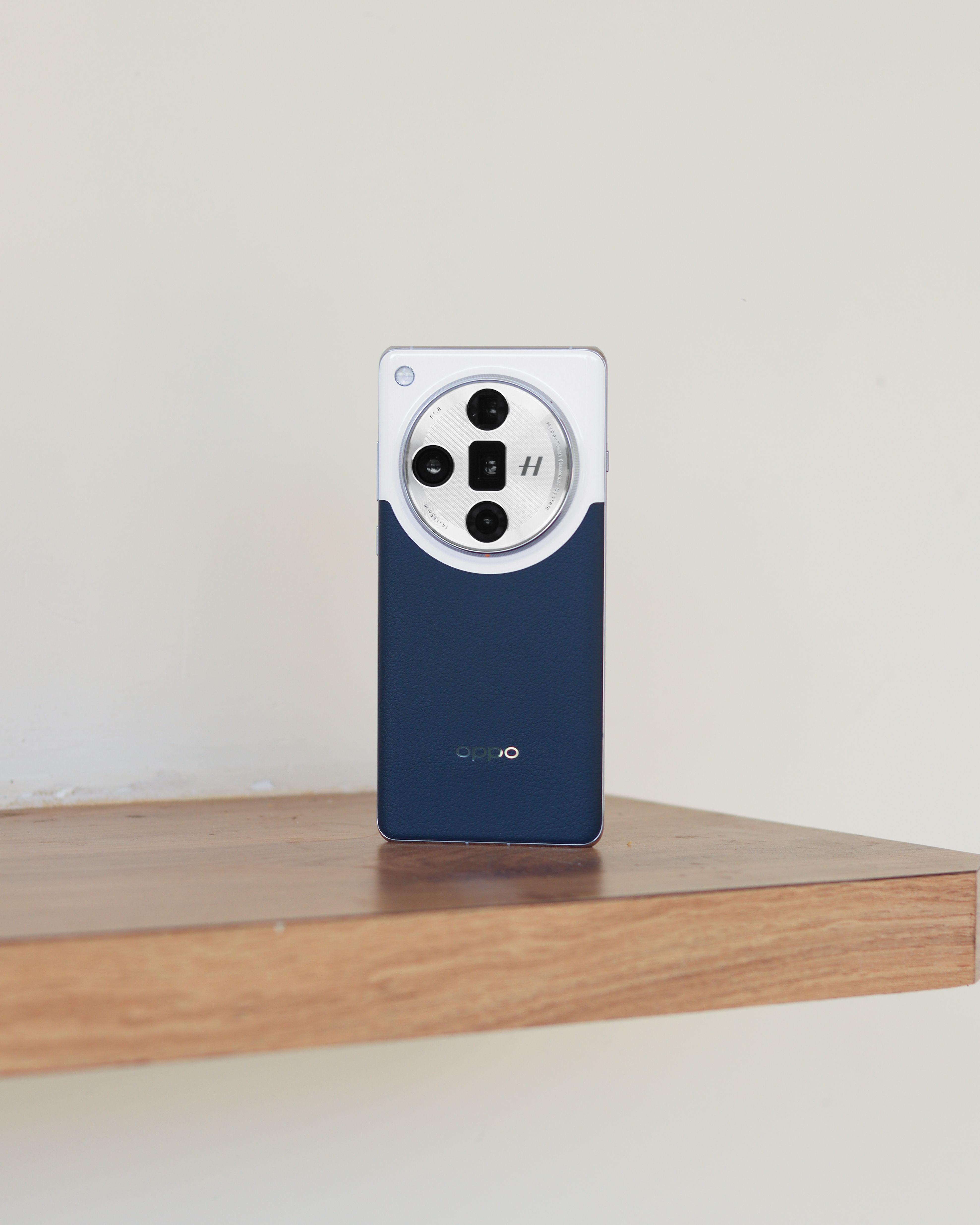 Oppo Phone Standing on Edge of Table · Free Stock Photo