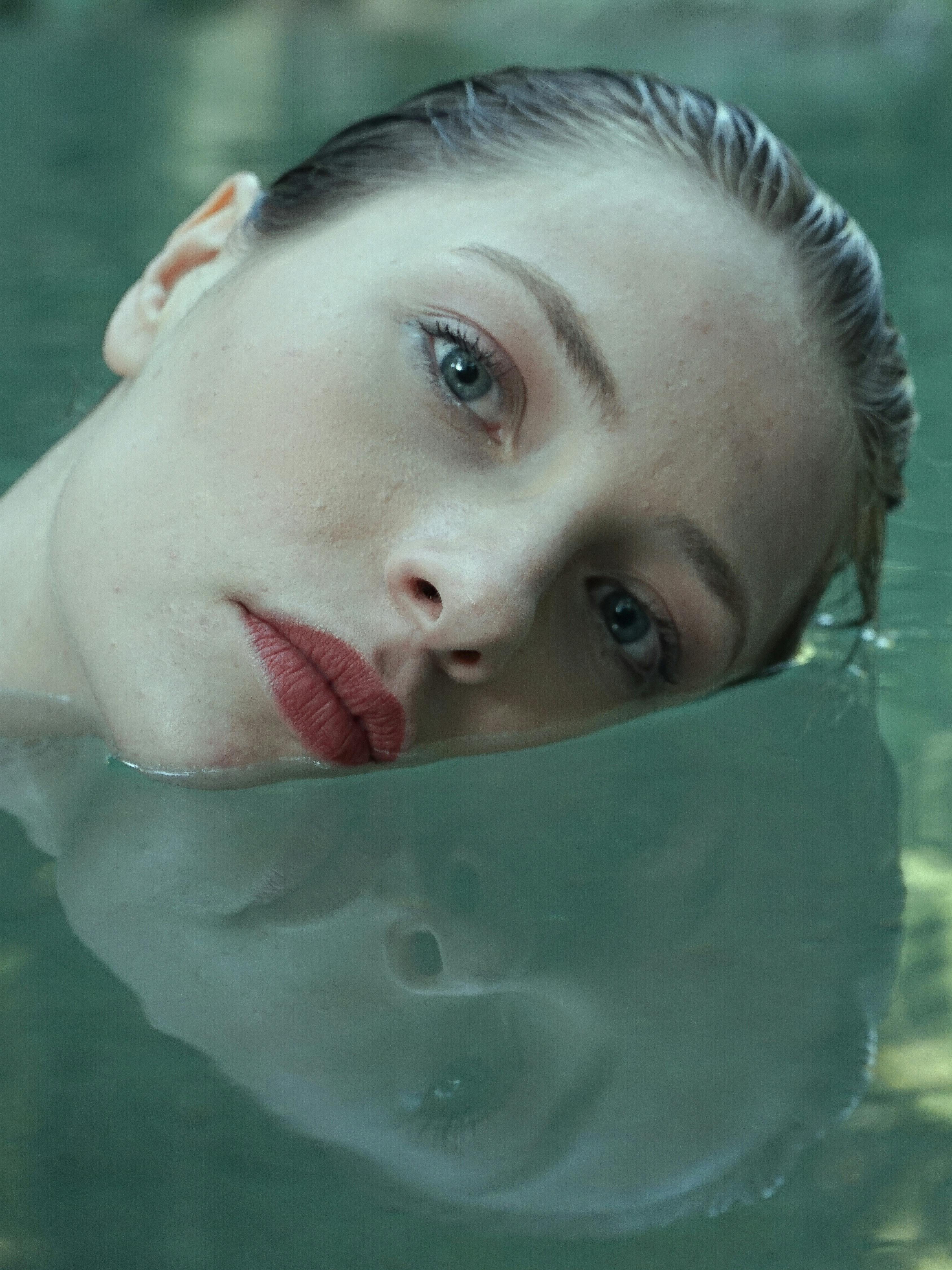 Beautiful Woman Posing in Water · Free Stock Photo