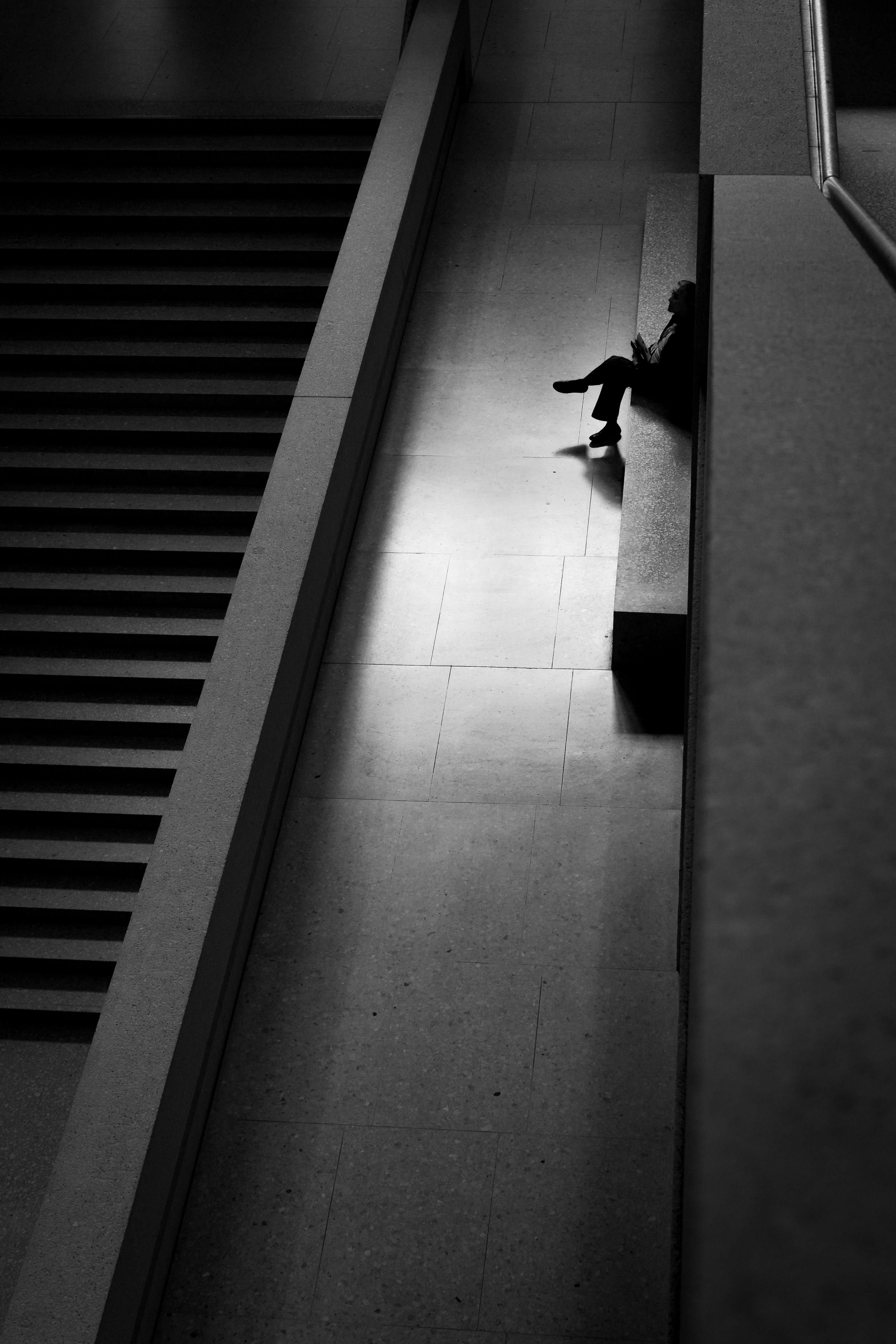 Man Walking on White Platform · Free Stock Photo