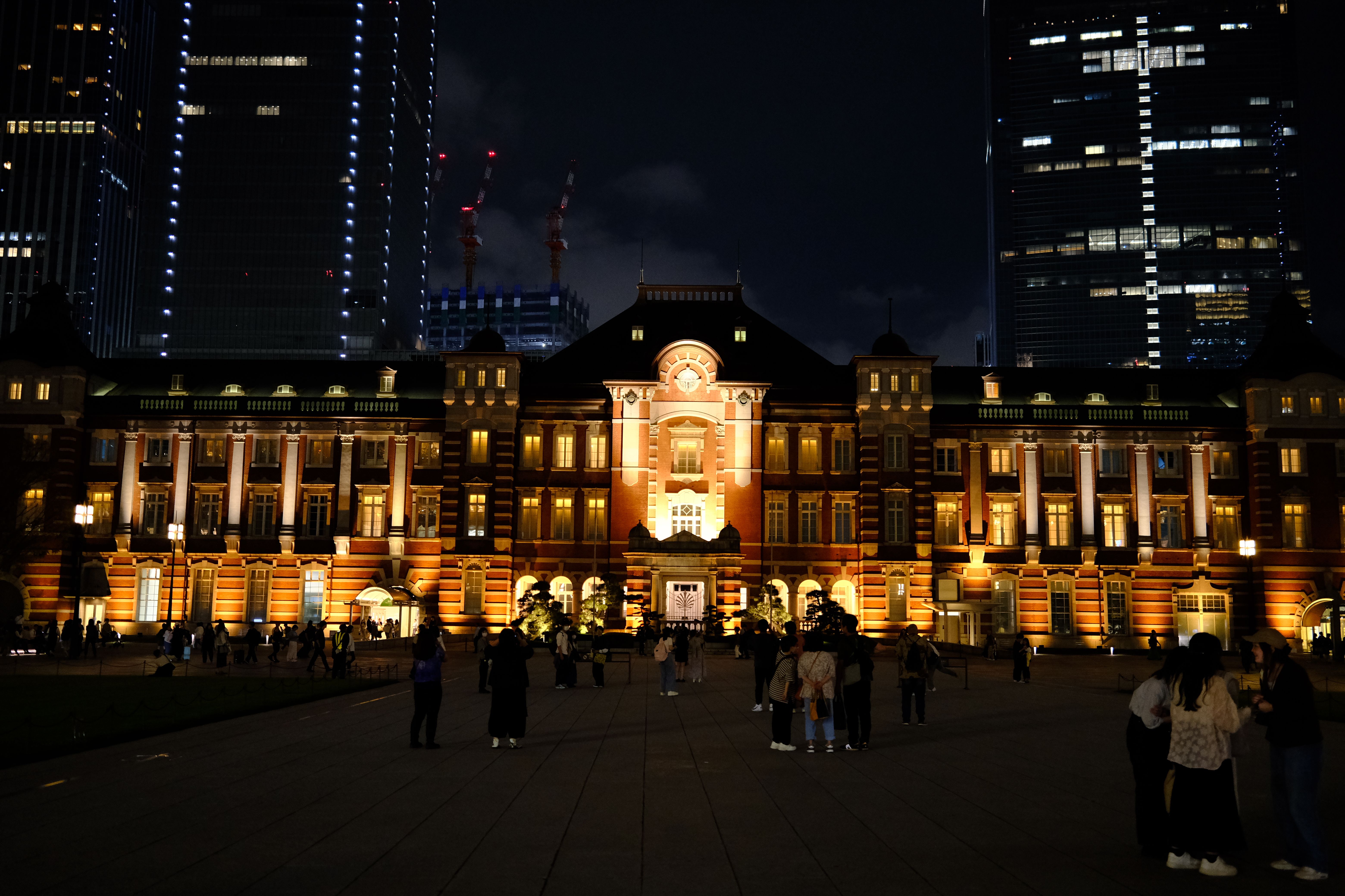 A large building with many people standing in front of it · Free Stock ...
