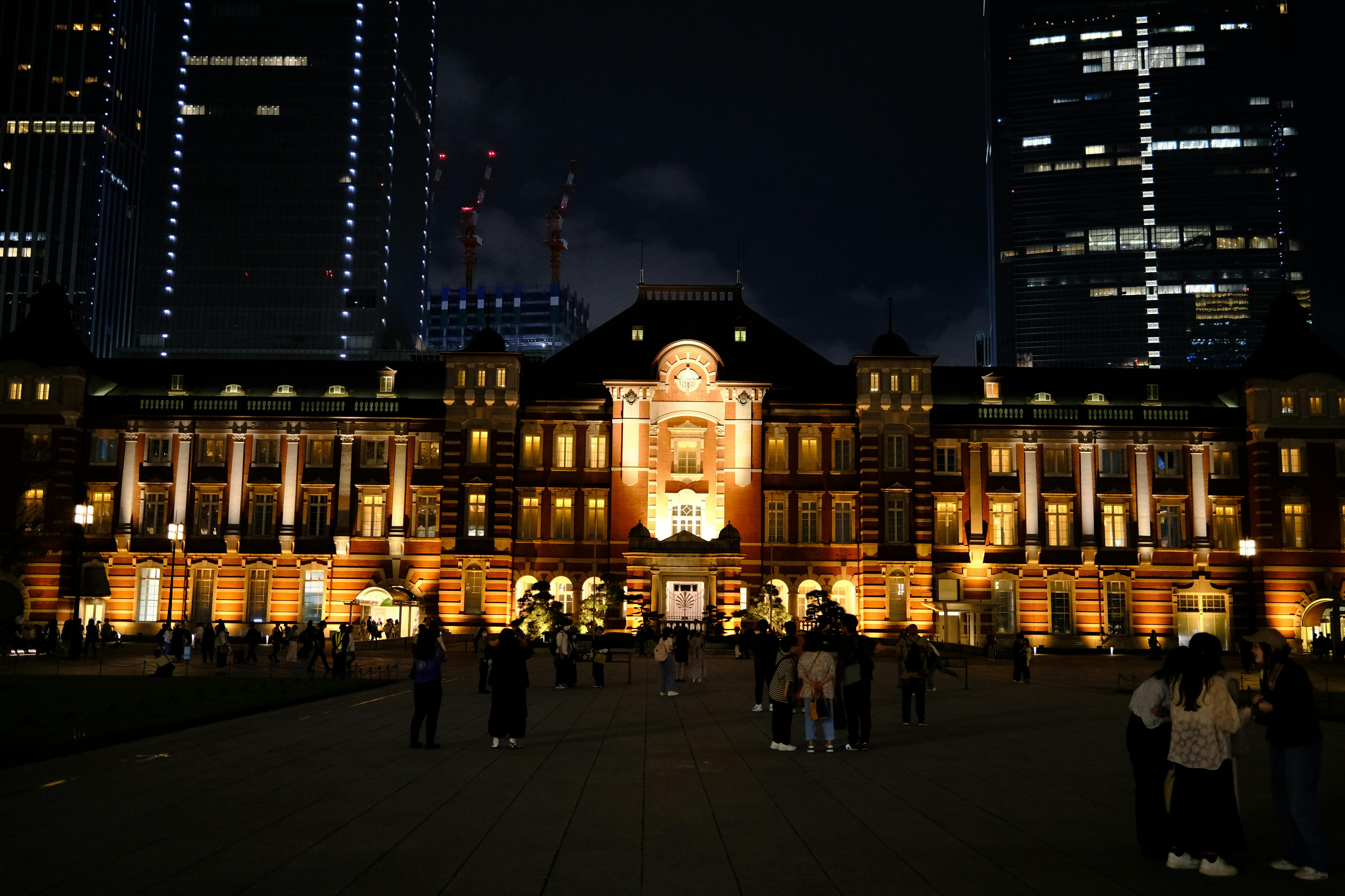 People Walking On The Streets Surrounded By Buildings · Free Stock Photo
