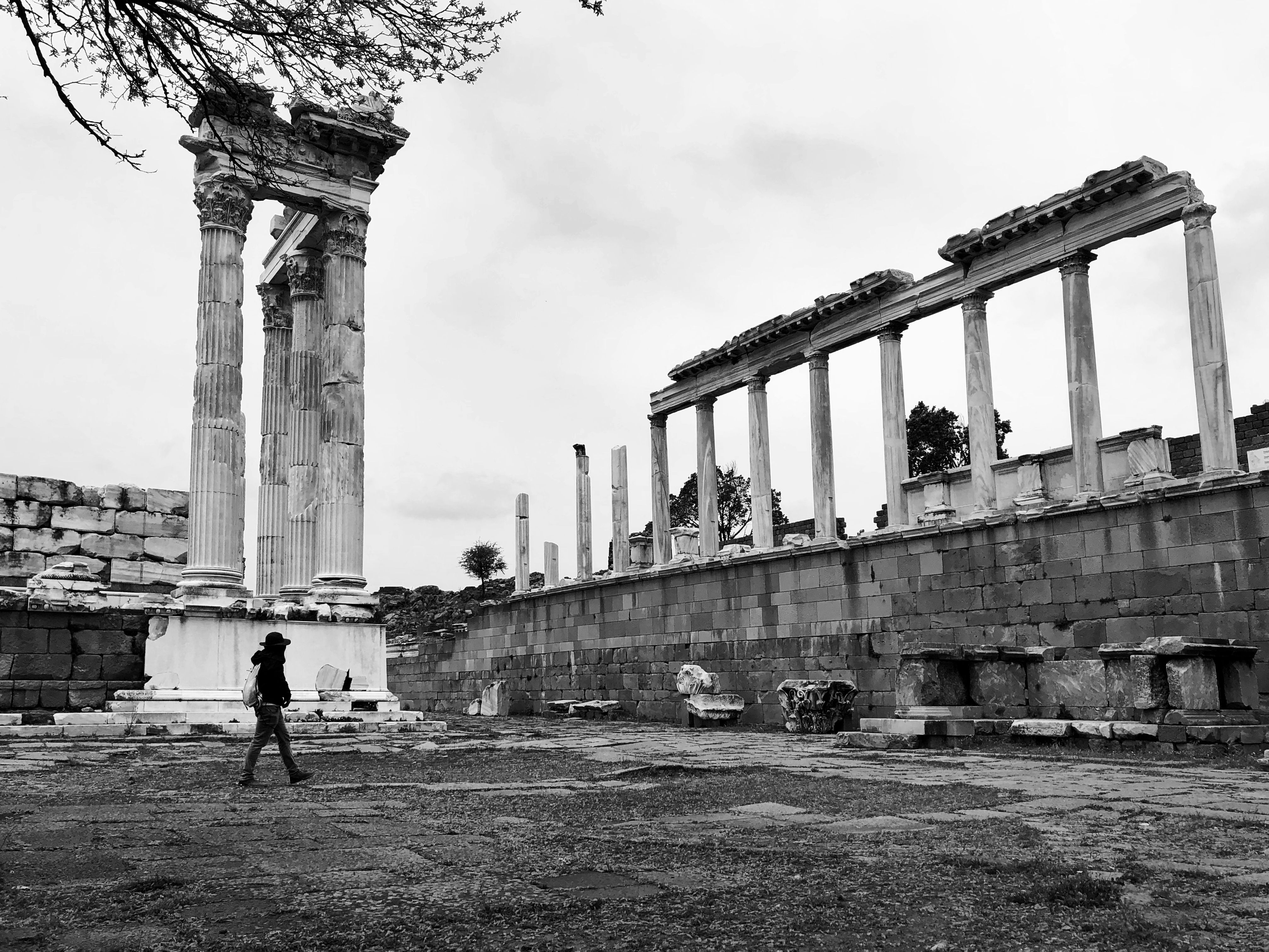Woman Walking in Ancient Ruins · Free Stock Photo