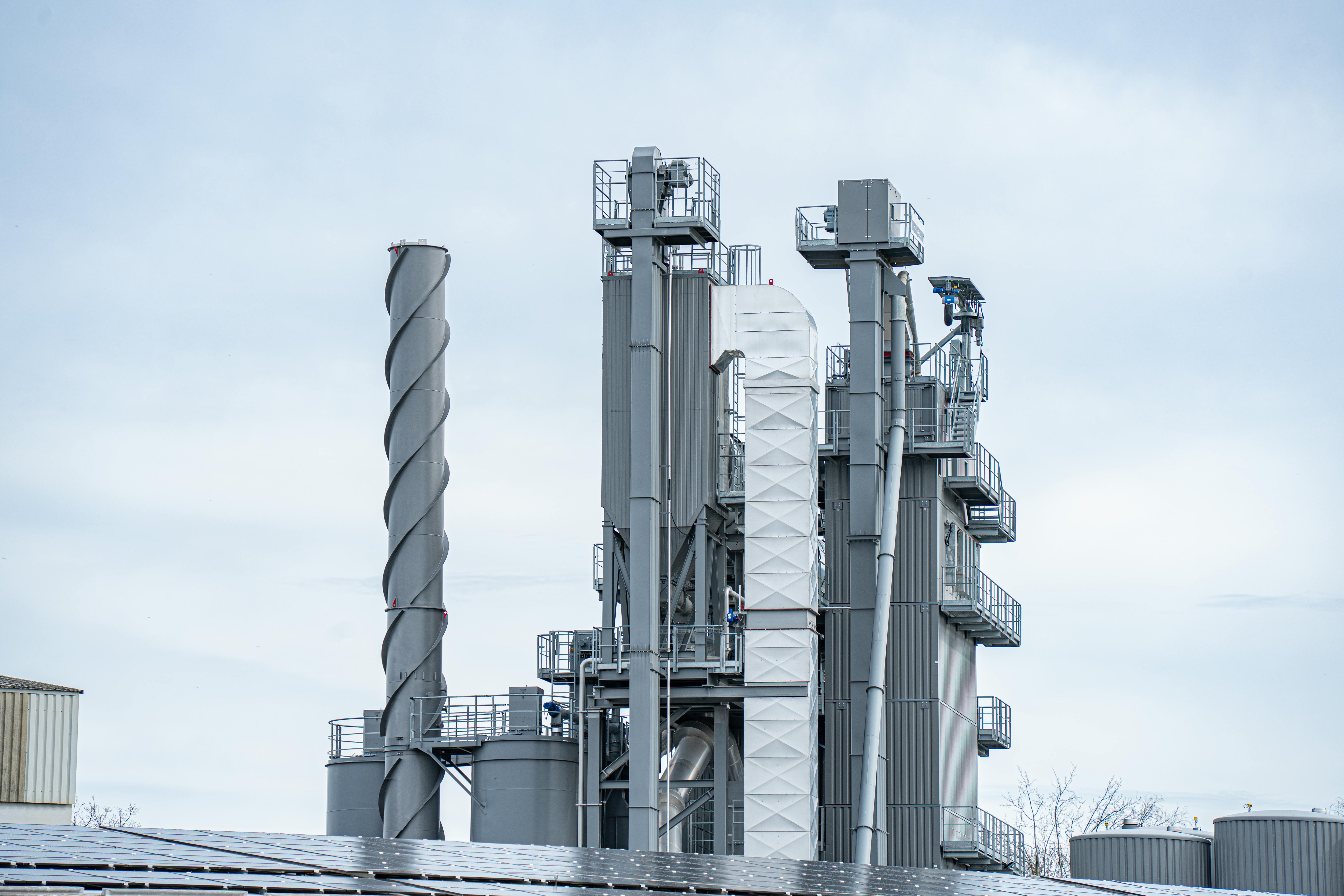 Gray Chimneys of Factory · Free Stock Photo