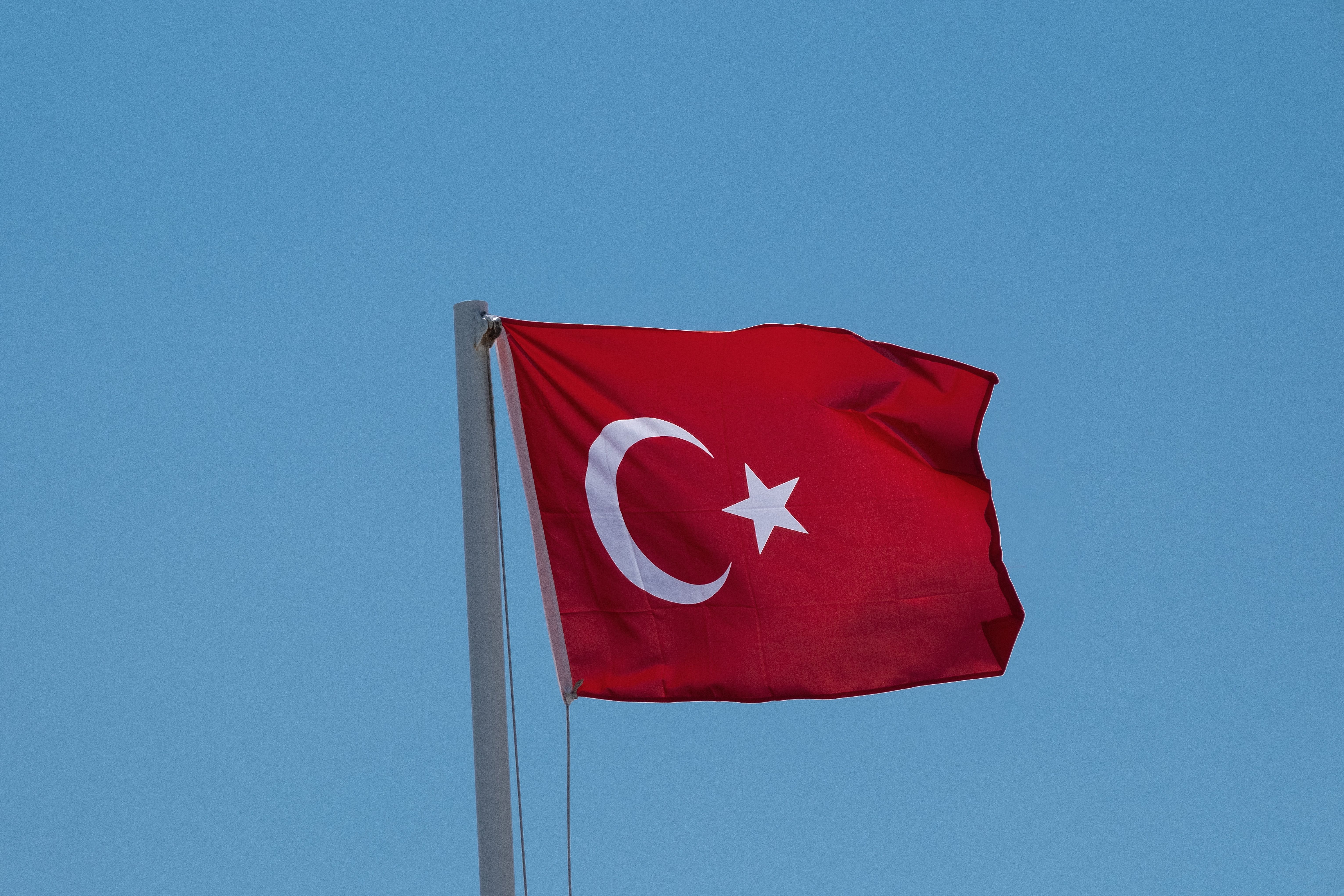 Turkey's flag is flying high in the sky · Free Stock Photo