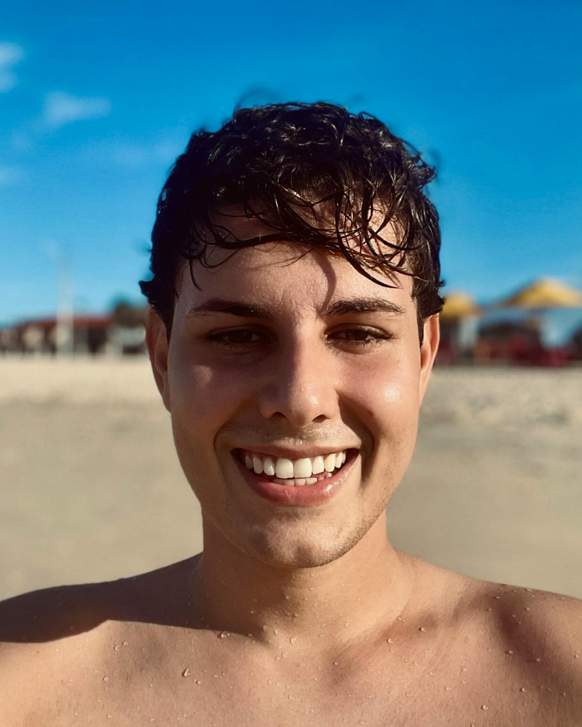 Close-up of a Young Man on the Beach · Free Stock Photo