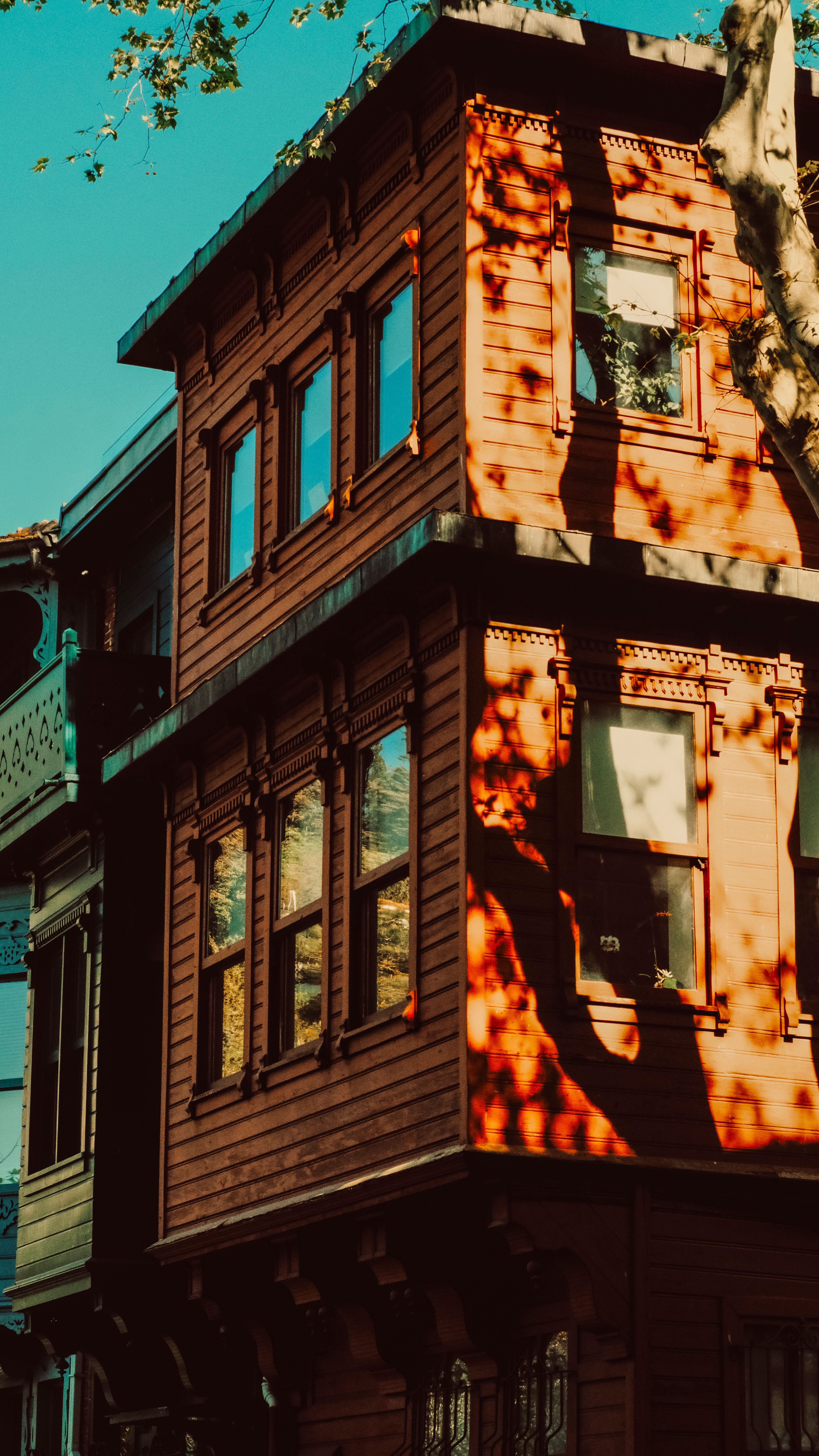 Back Lit Shot of a Residential Building · Free Stock Photo