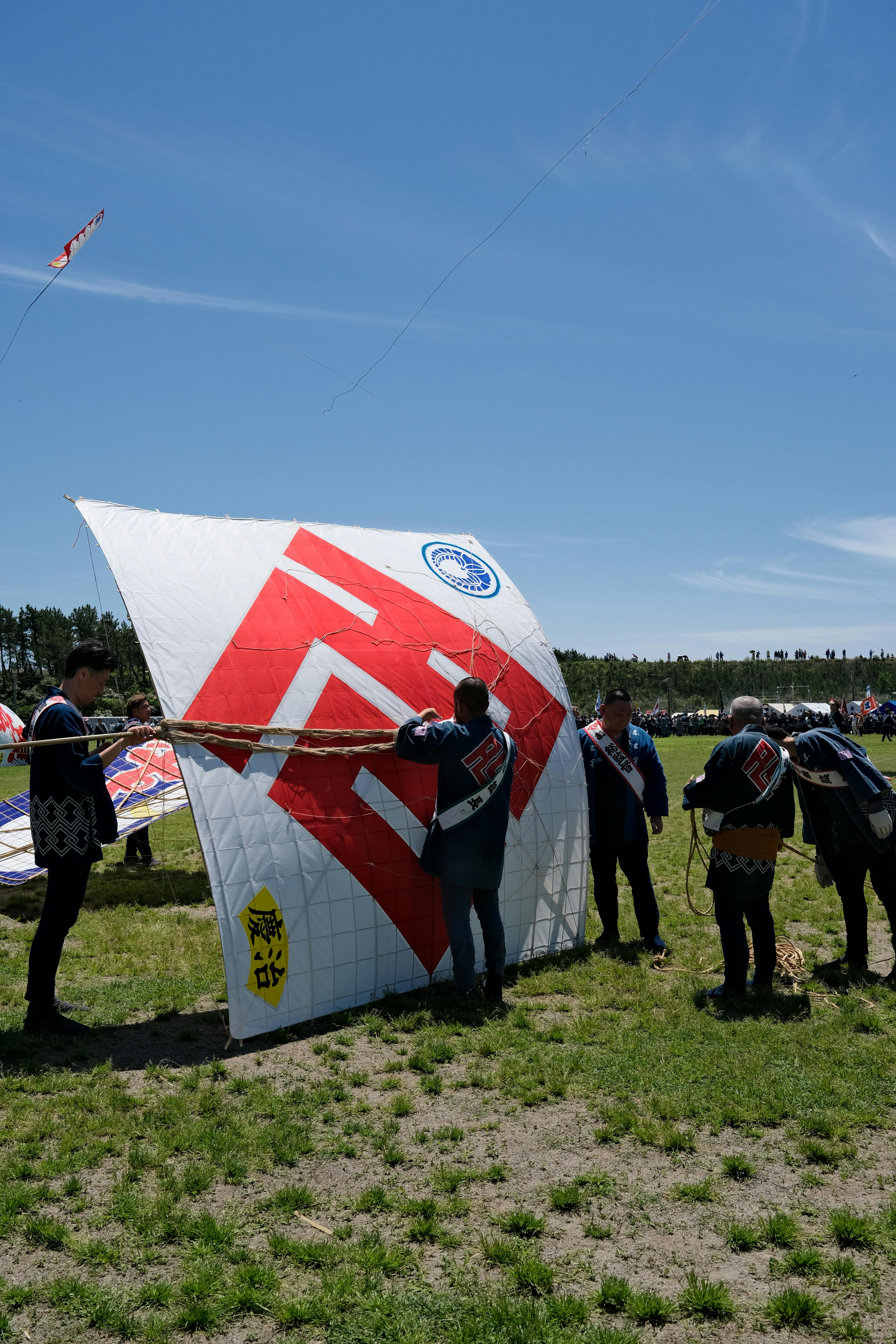 A Person Standing with a Kite at the Hamamatsu Kite Festival · Free ...