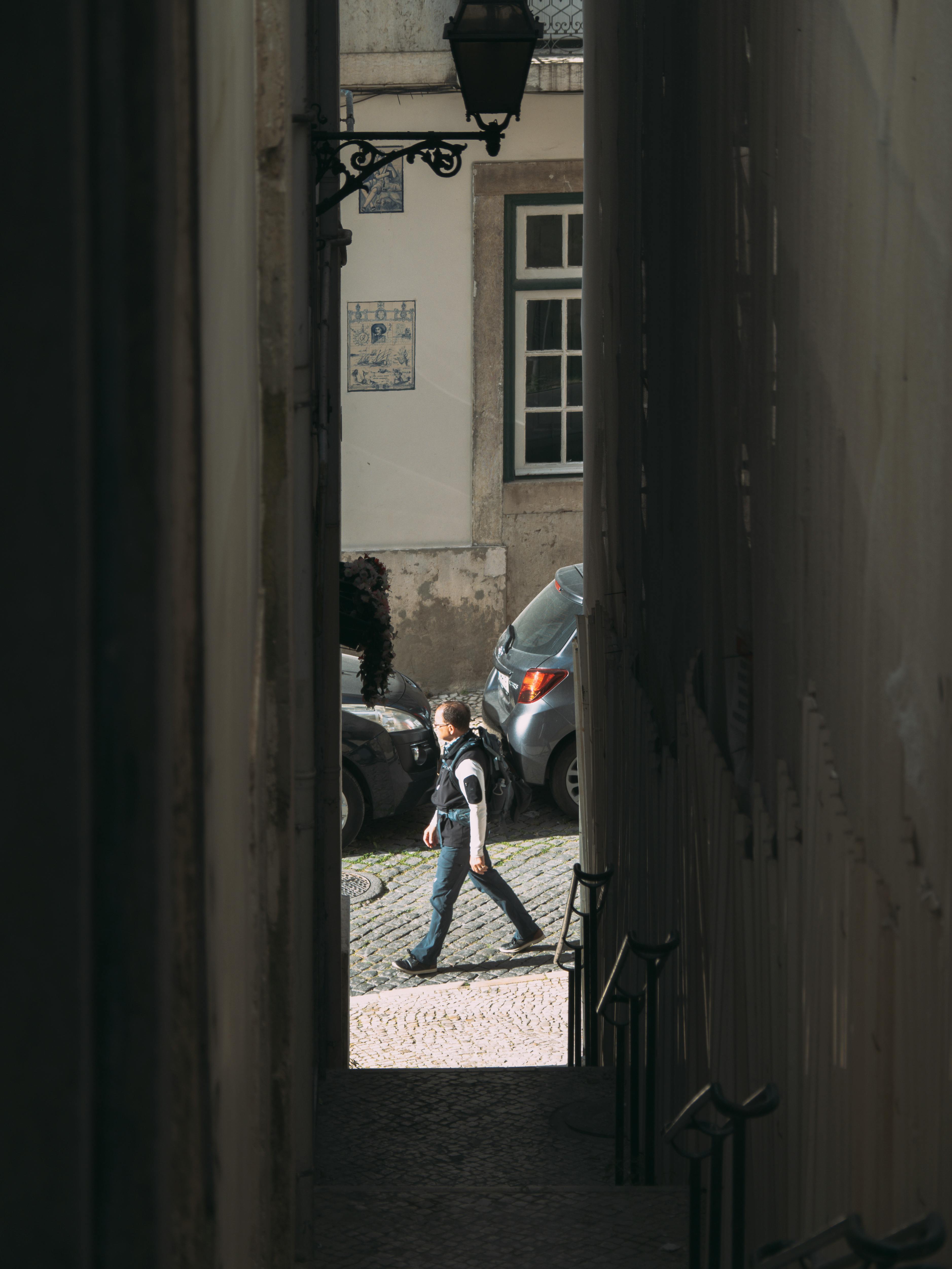 Man Walking Down a Street · Free Stock Photo