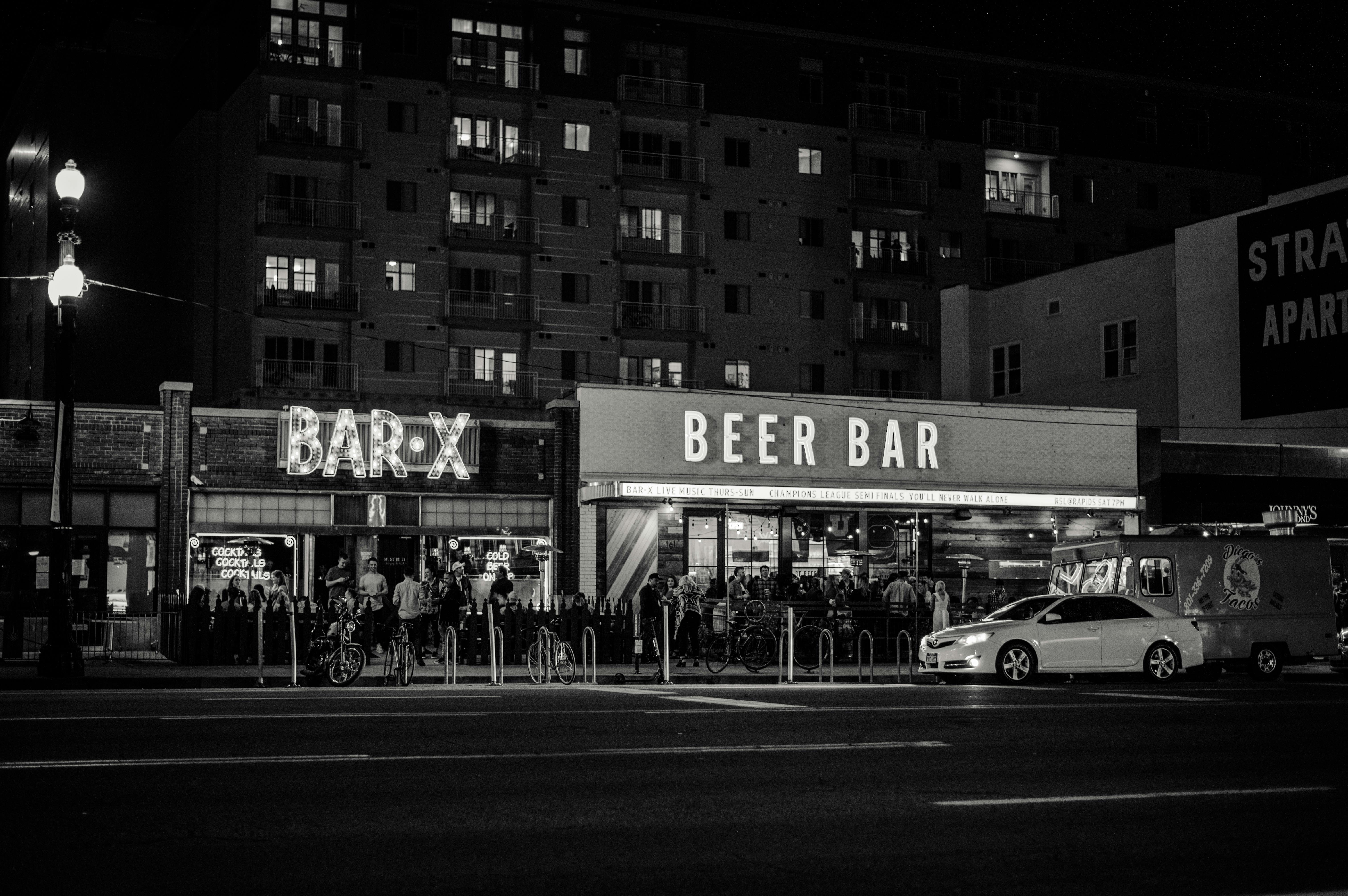 Grayscale Photo of Beer Bar Signage · Free Stock Photo
