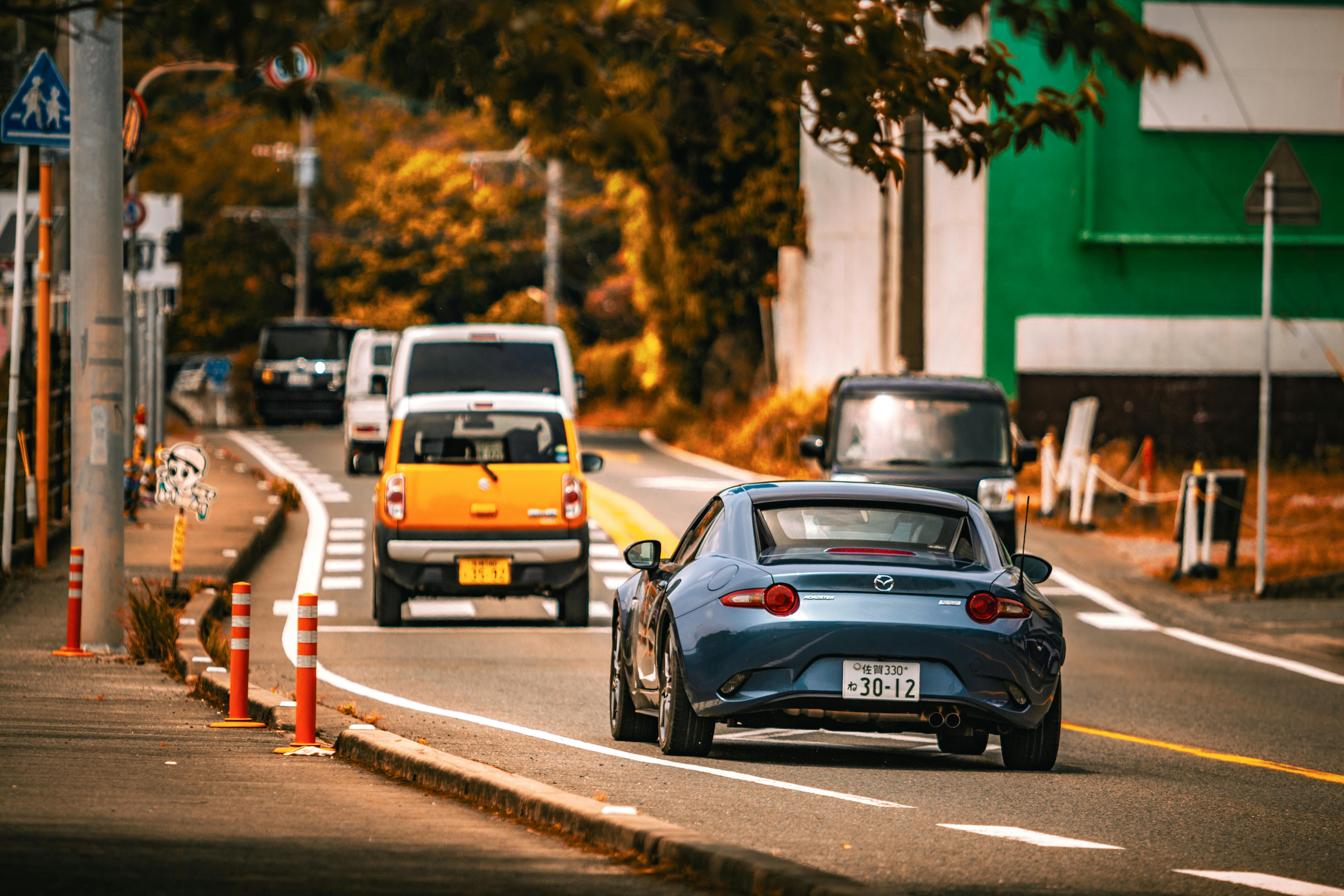 Cars on Street in Town · Free Stock Photo