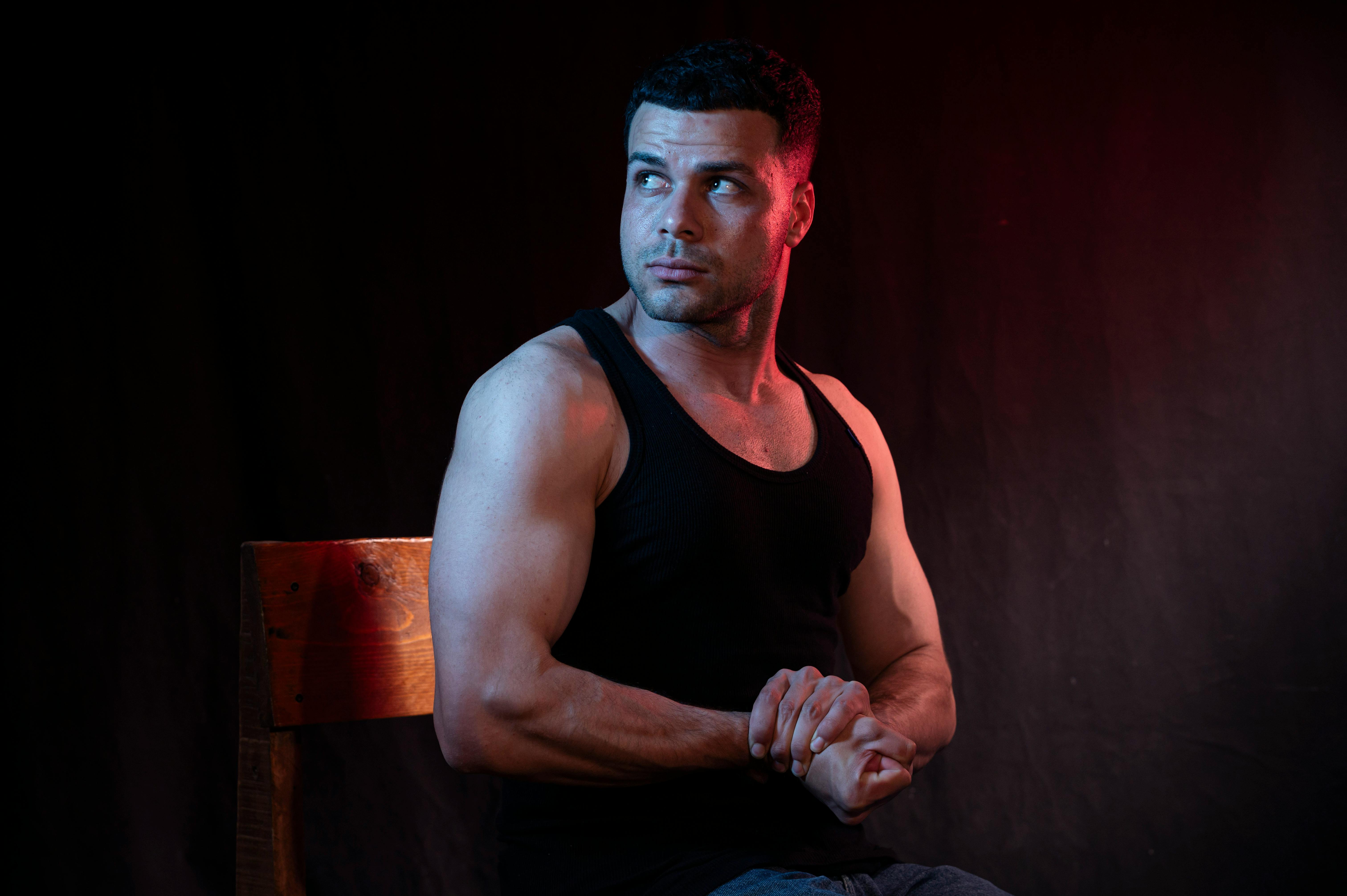 Bodybuilder Flexing Muscles · Free Stock Photo