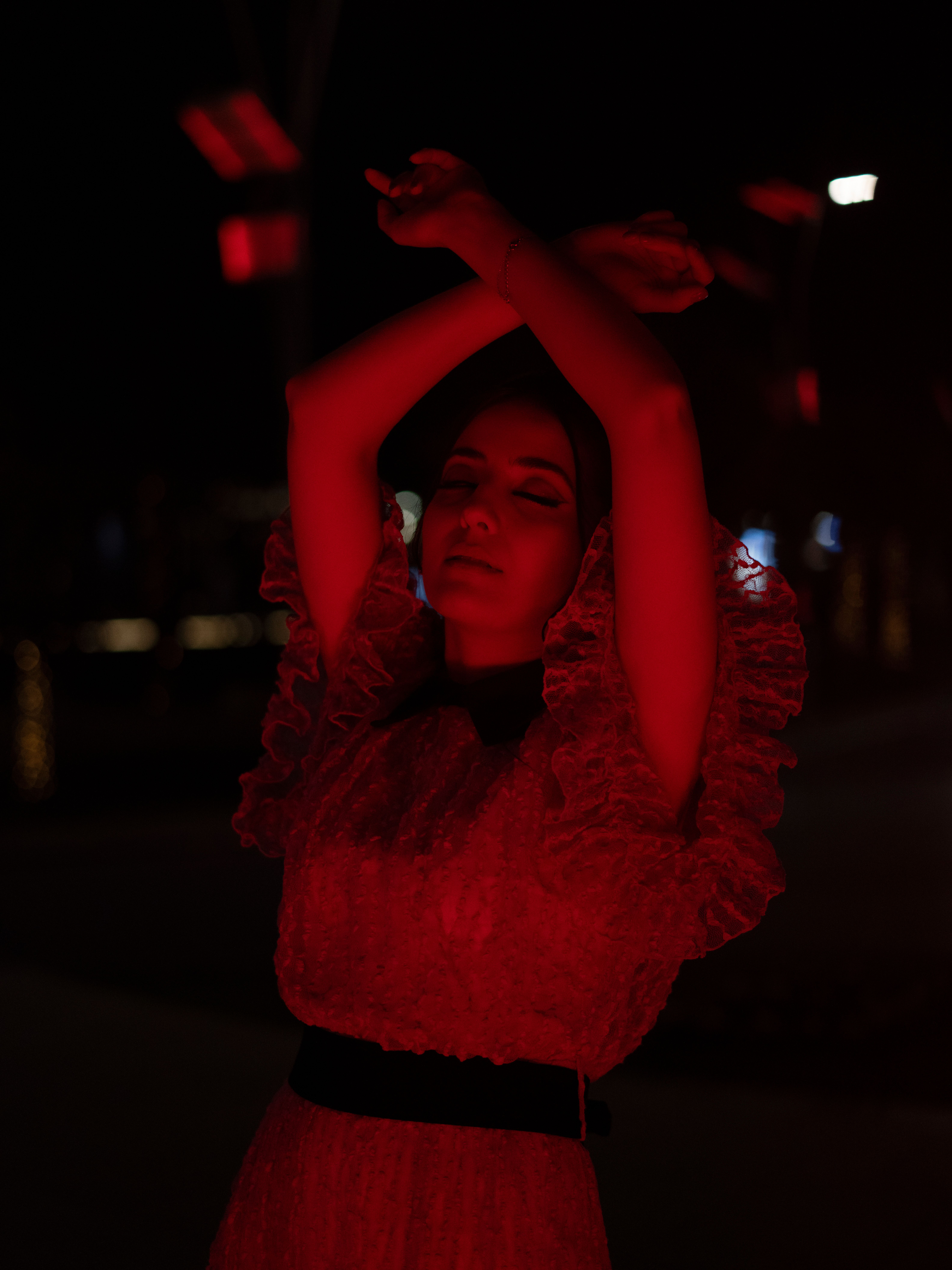 Young Woman in Dancing in Red Lighting · Free Stock Photo