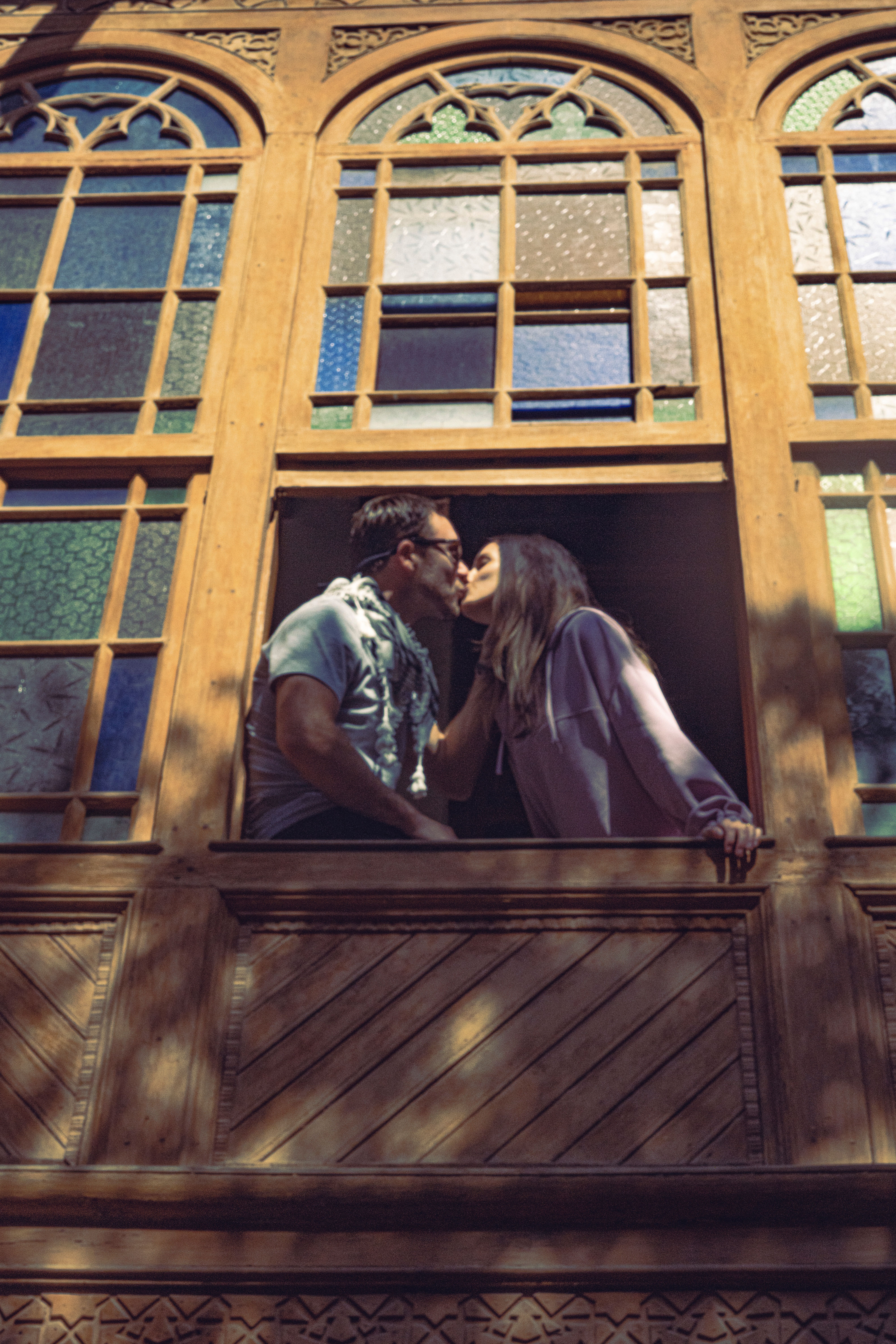 Couple Kissing in Window · Free Stock Photo