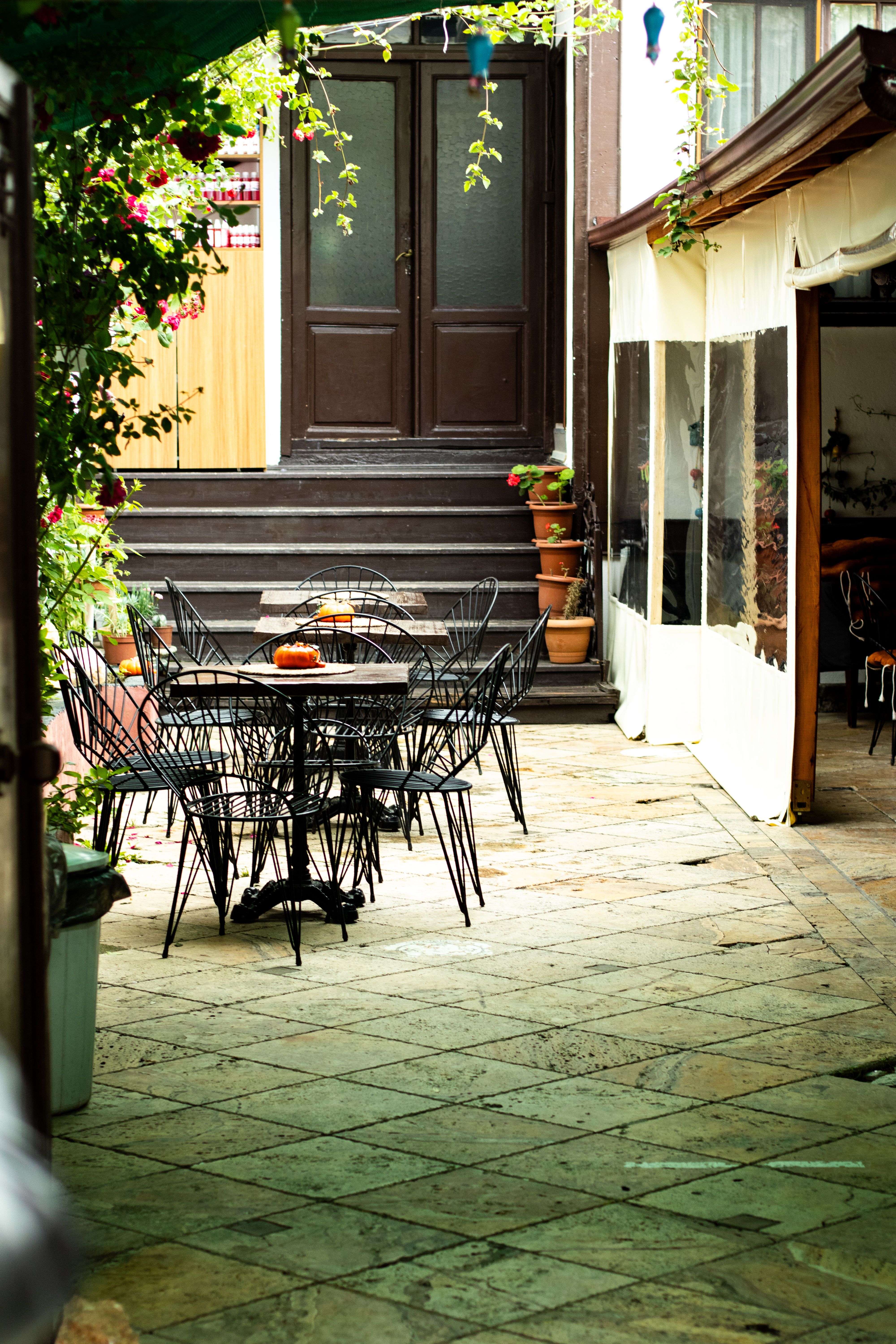 Brown and Orange 3-piece Patio Set Outside A Coffee Shop · Free Stock Photo