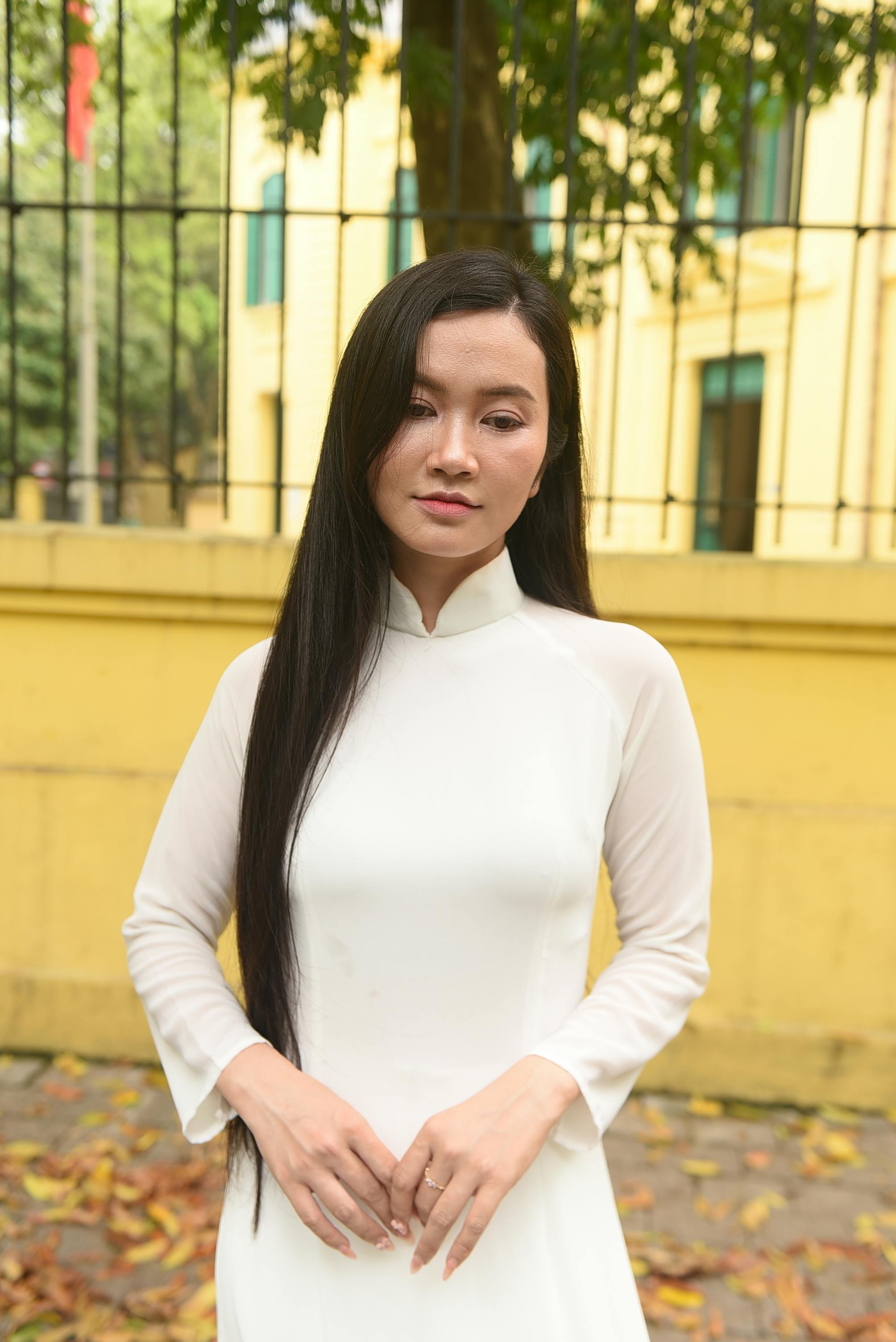 Portrait of Woman in White, Traditional Dress · Free Stock Photo