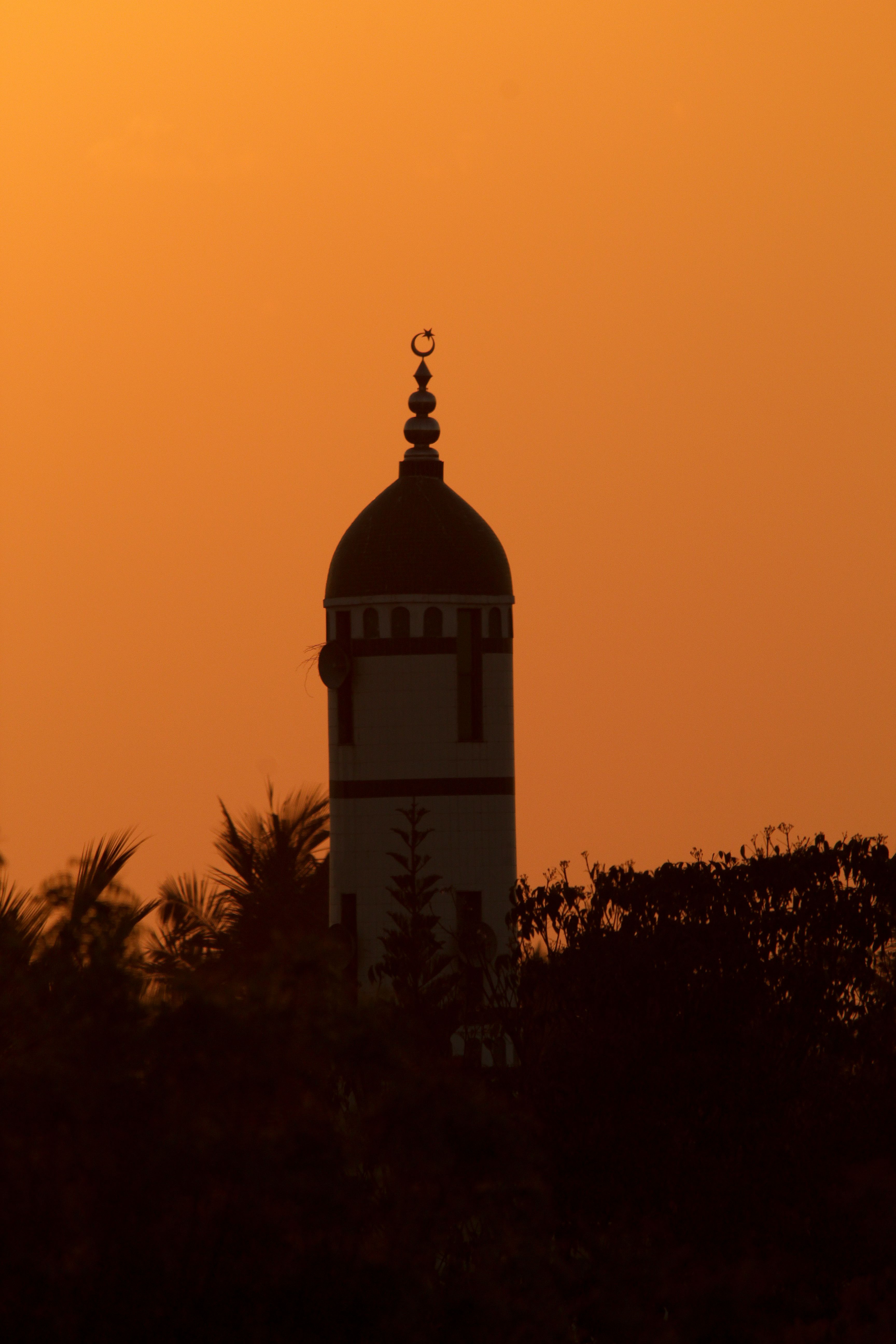 Yellow Sky over Minaret at Sunset · Free Stock Photo