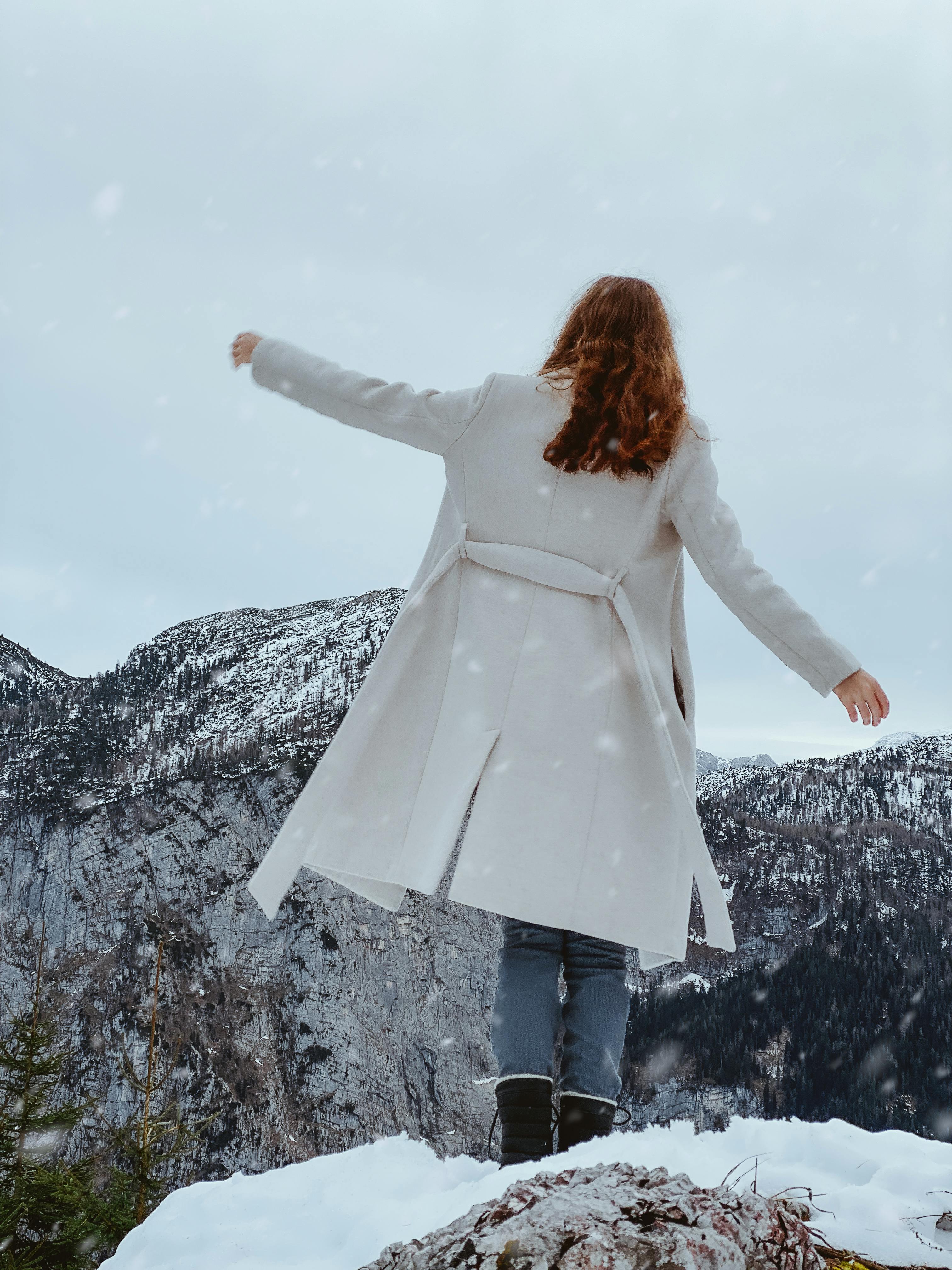 Back View of Woman in White Coat in Winter · Free Stock Photo