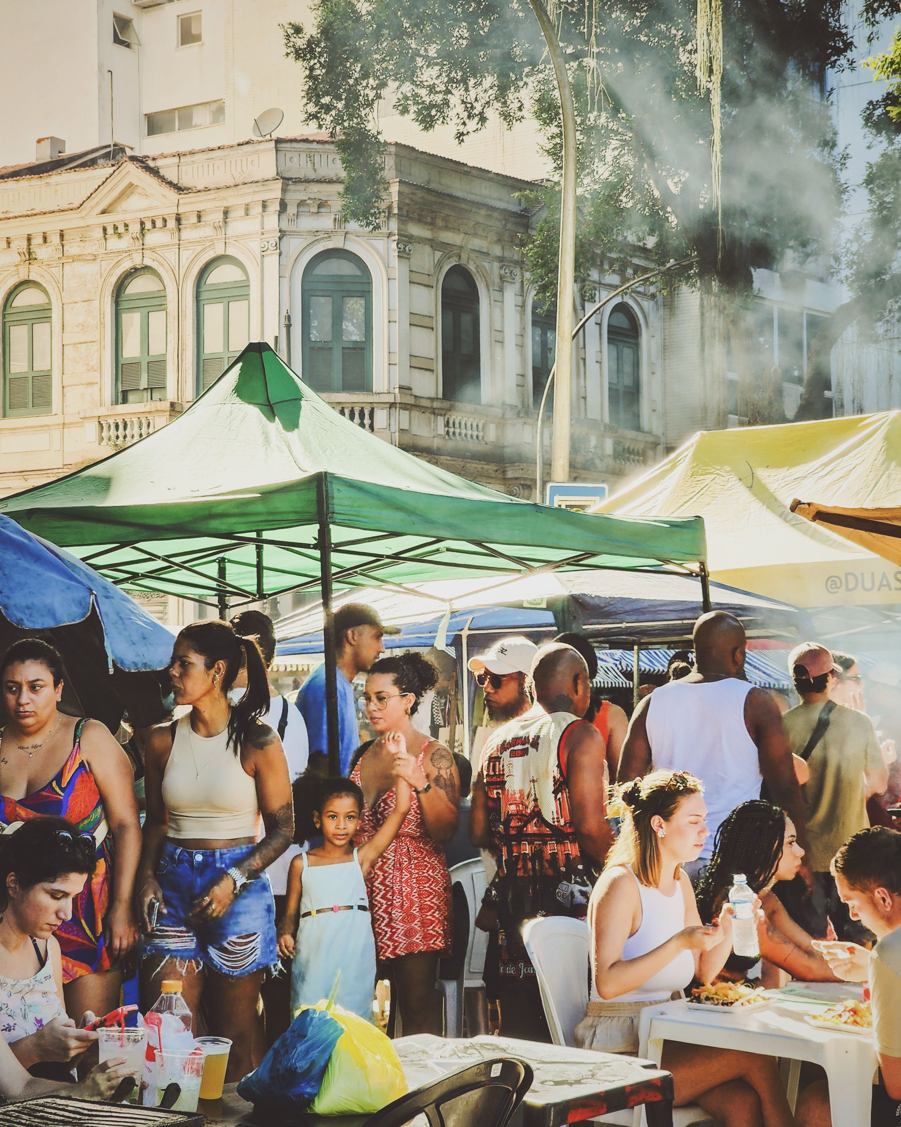 View of People Walking around the Food Stalls at a Street Food Market ...