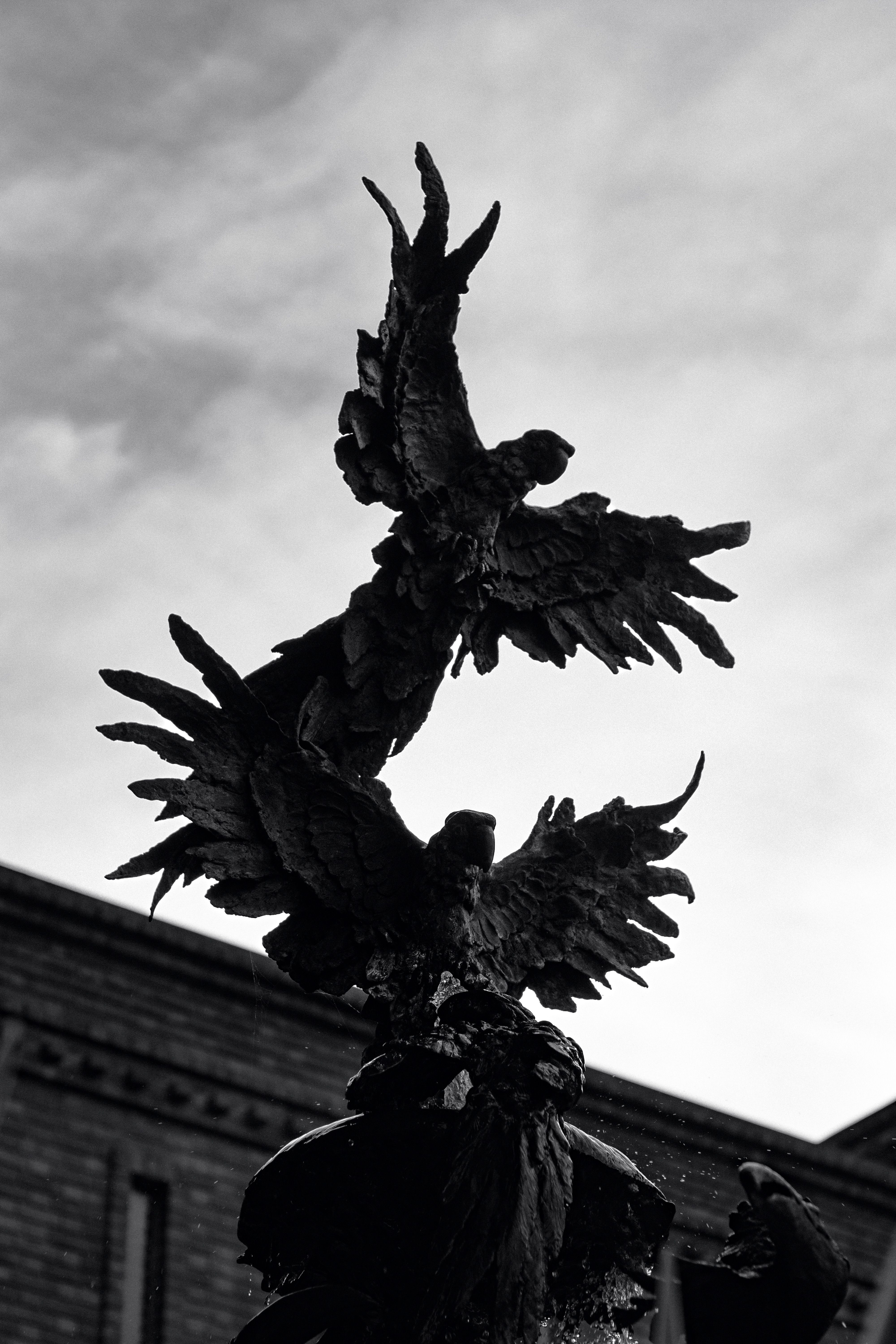 Silhouetted Statue of Birds · Free Stock Photo