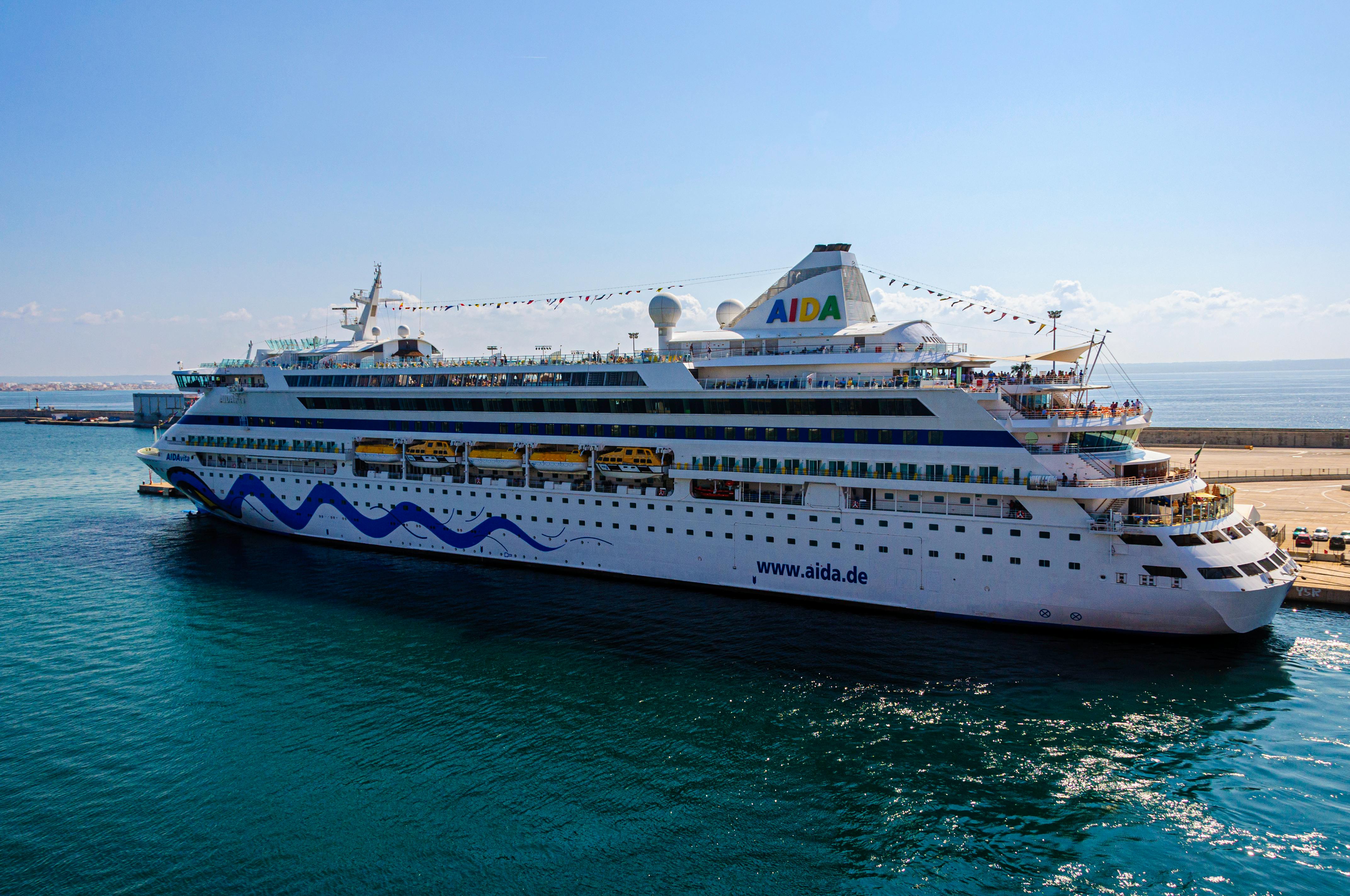 White and Blue Cruise Ship on Sea · Free Stock Photo