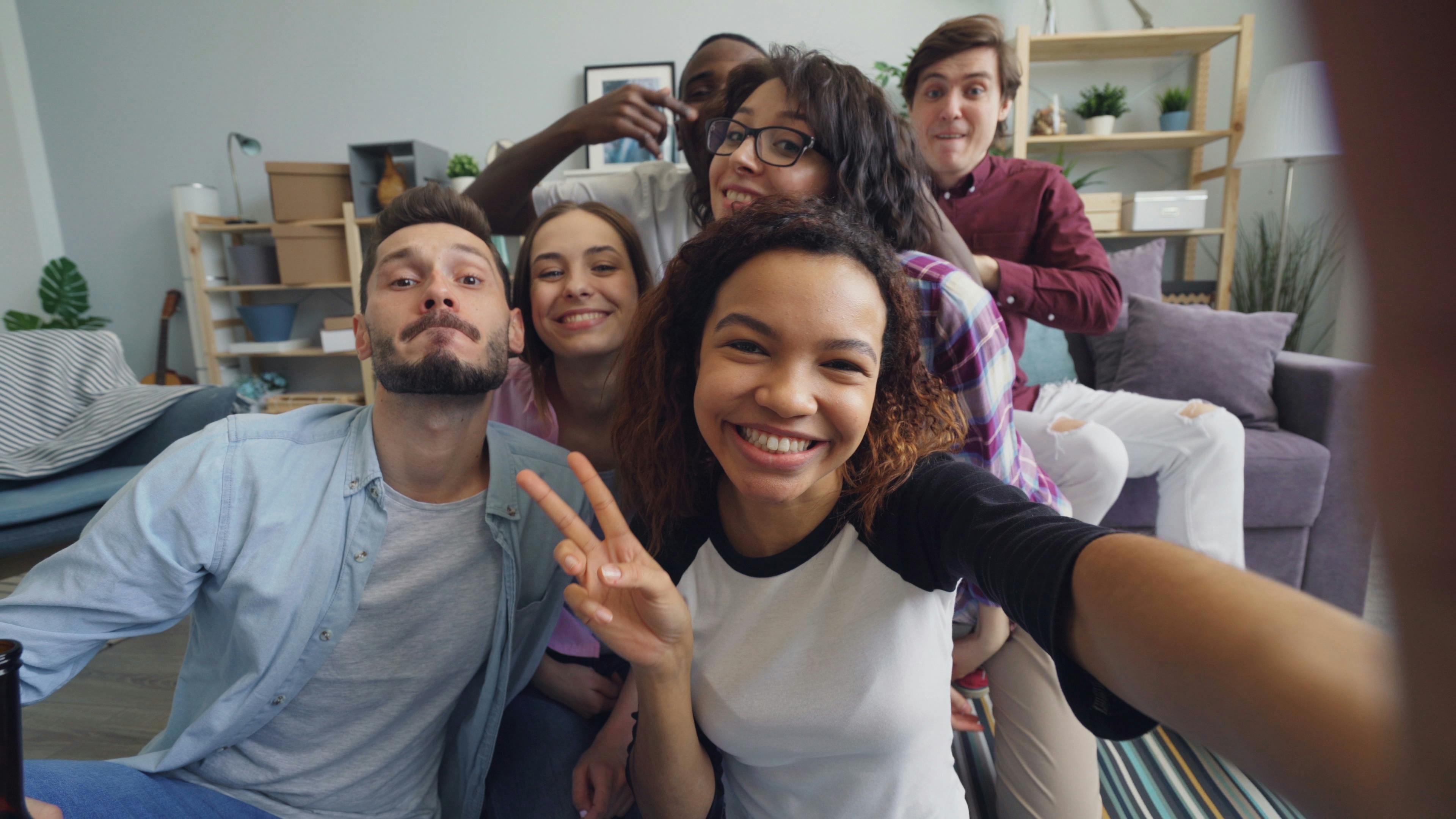 A group of people taking a selfie together · Free Stock Photo