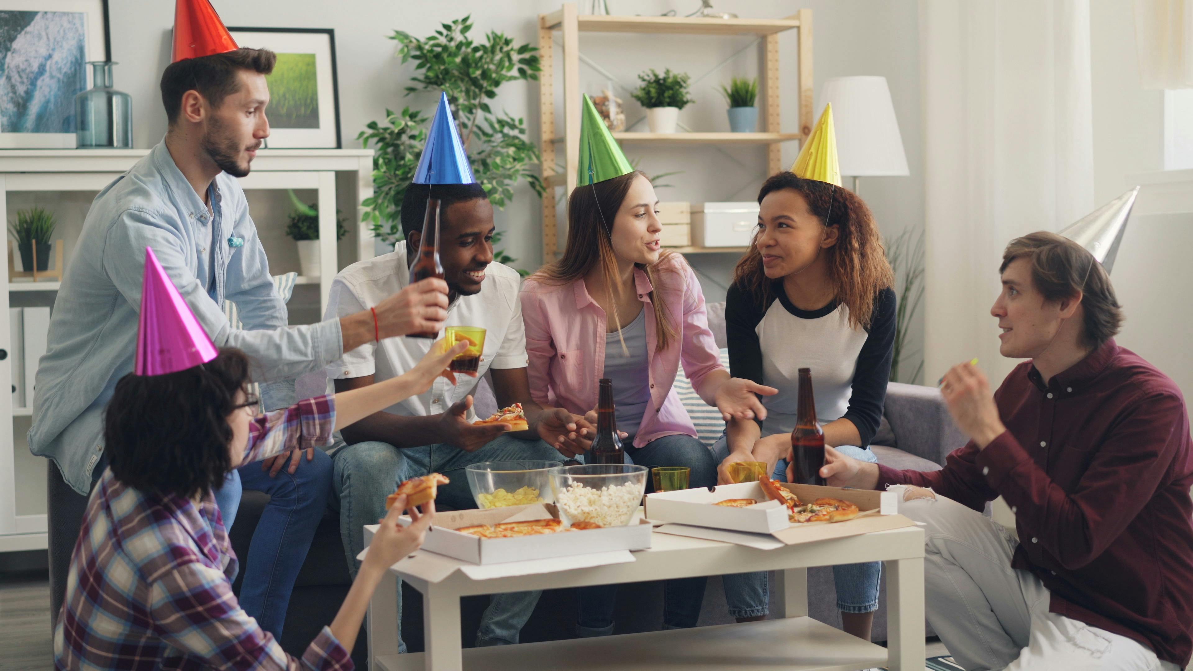 A group of people celebrating a birthday party · Free Stock Photo