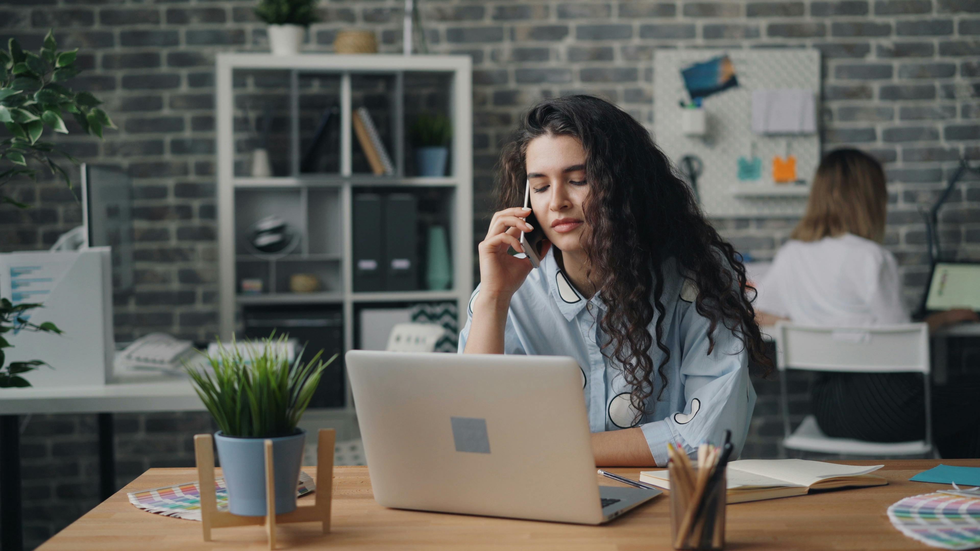 Girl Sitting On A Couch Using A Laptop · Free Stock Photo